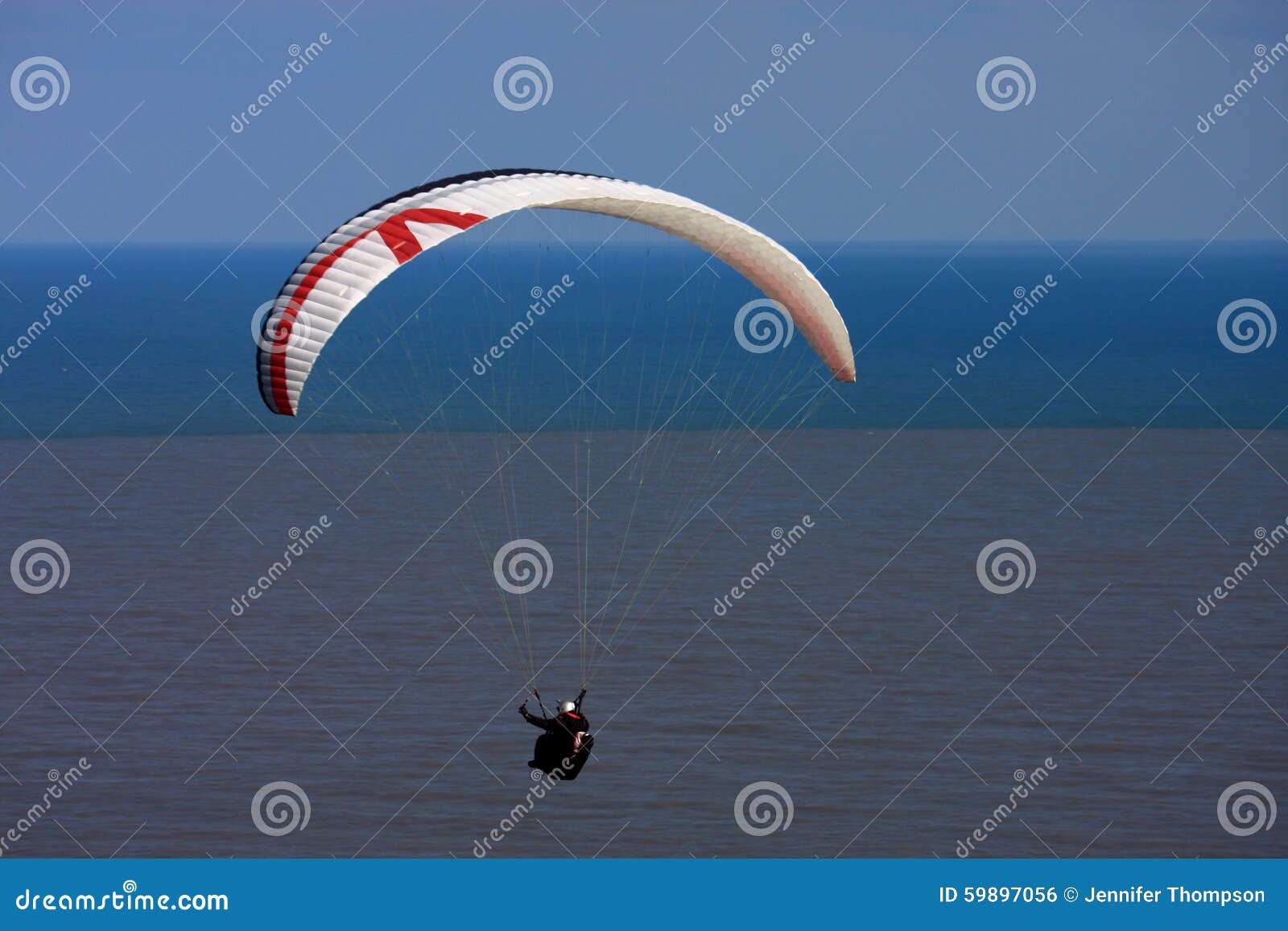 Paraglider over the sea stock photo. Image of transport - 59897056