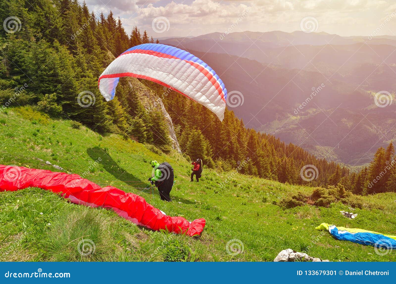 Paraglider Taking Off in Front of Spectacular Mountain Scenery Stock ...