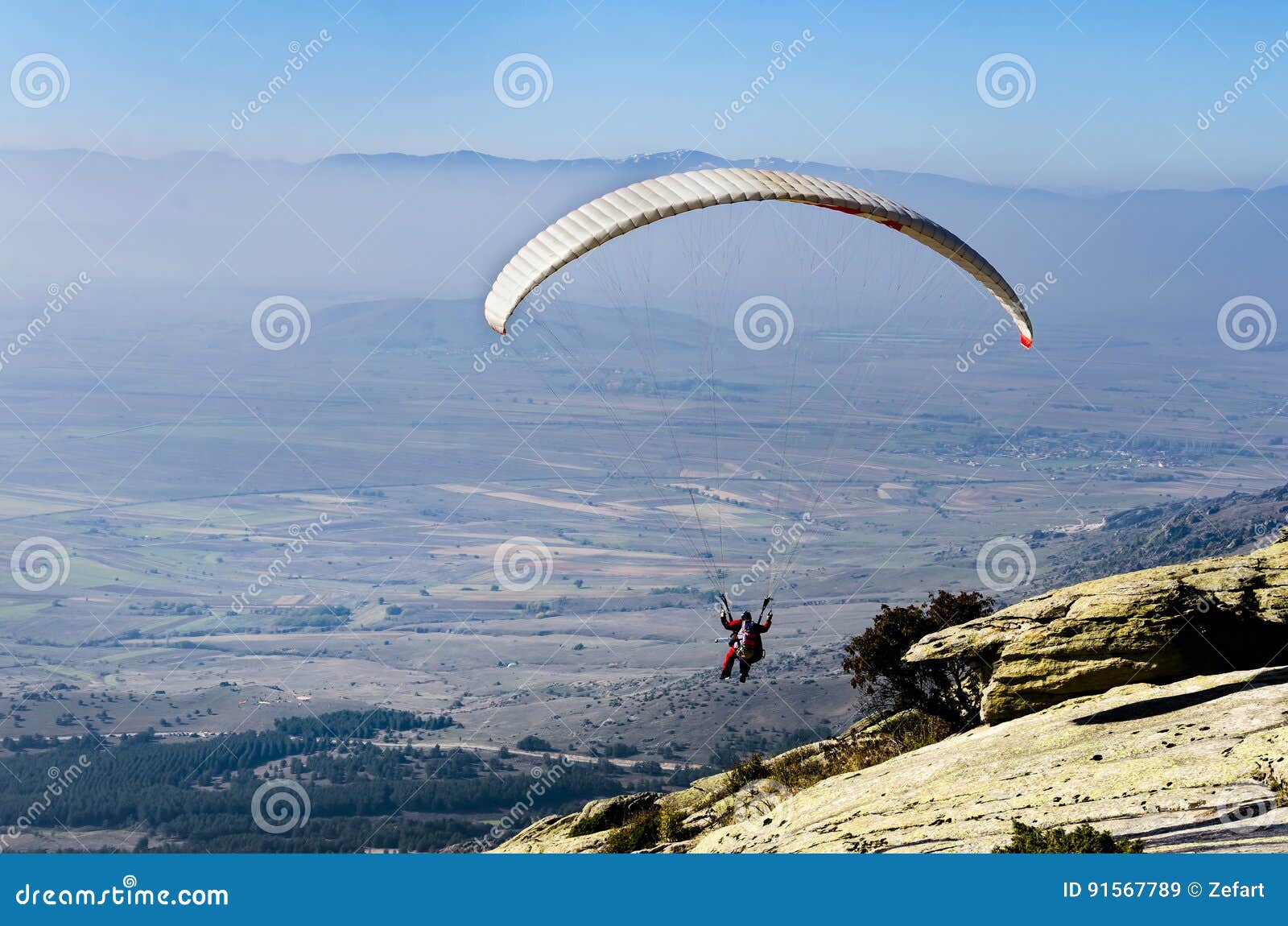 Paraglider taking off stock image. Image of paraglider - 91567789