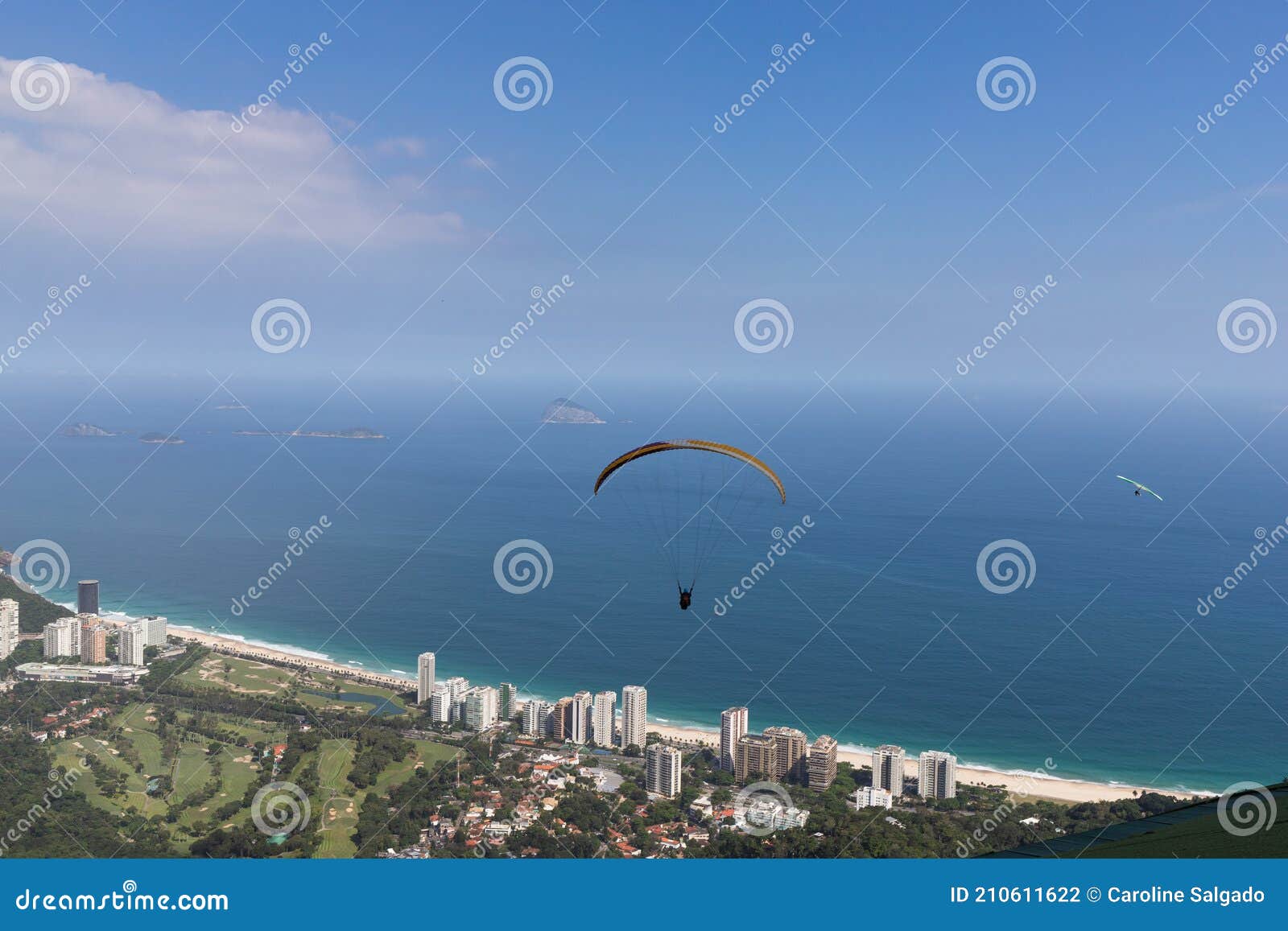 Paragliding Flight Over the Beach Stock Photo - Image of outdoor, pedra ...