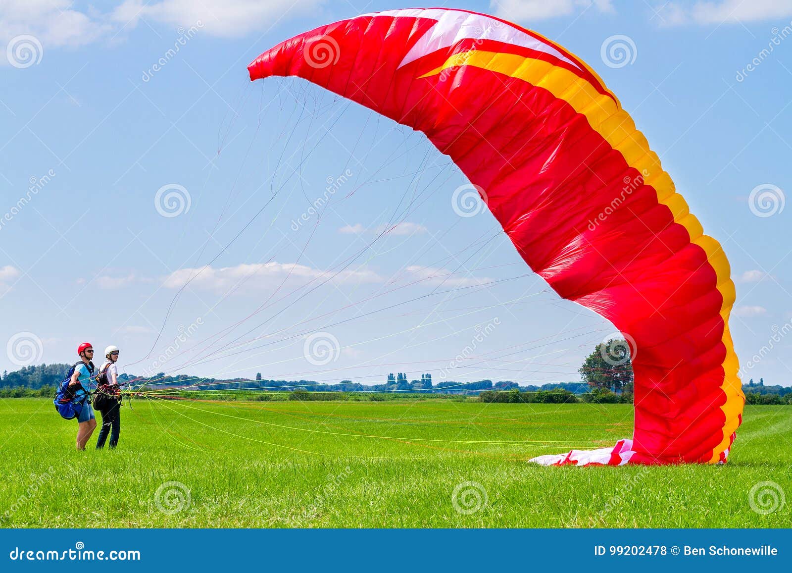 Paragliding Instructor with Boy Testing Kite Stock Photo - Image of ...