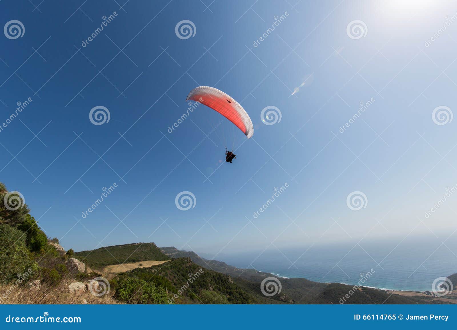 Paragliding in Italy stock image. Image of paraglider - 66114765