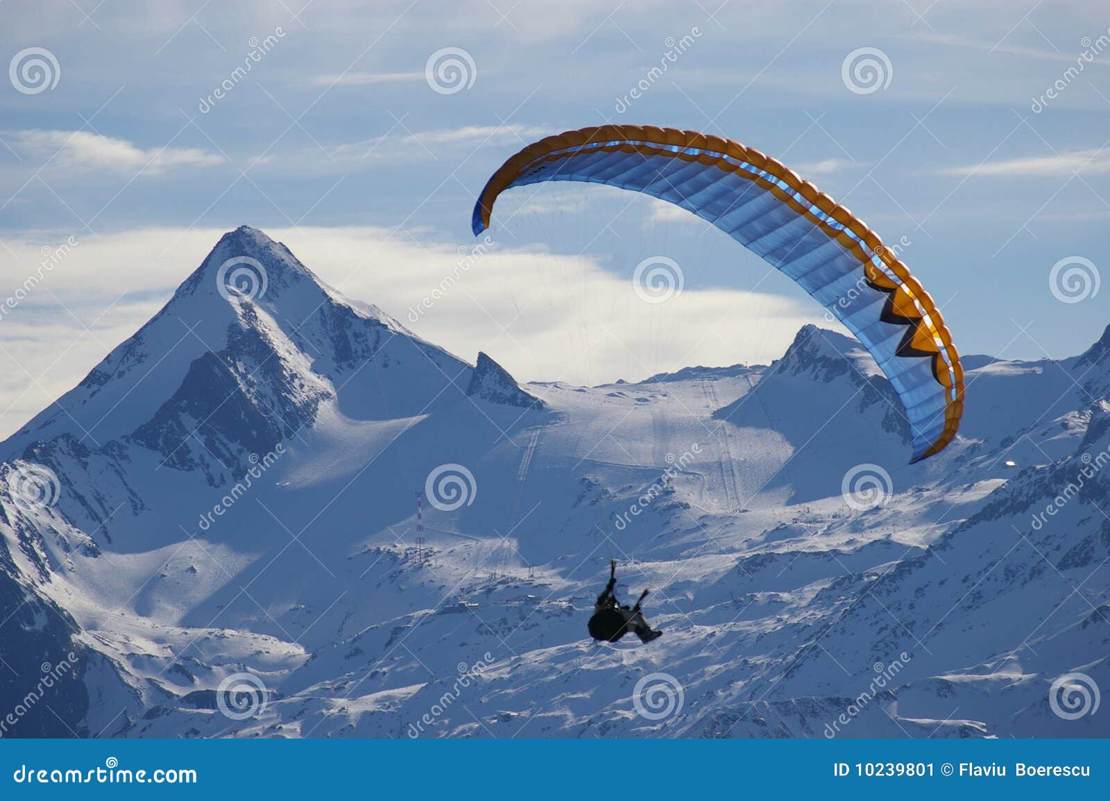 Paragliding over mountain stock image. Image of alps - 10239801