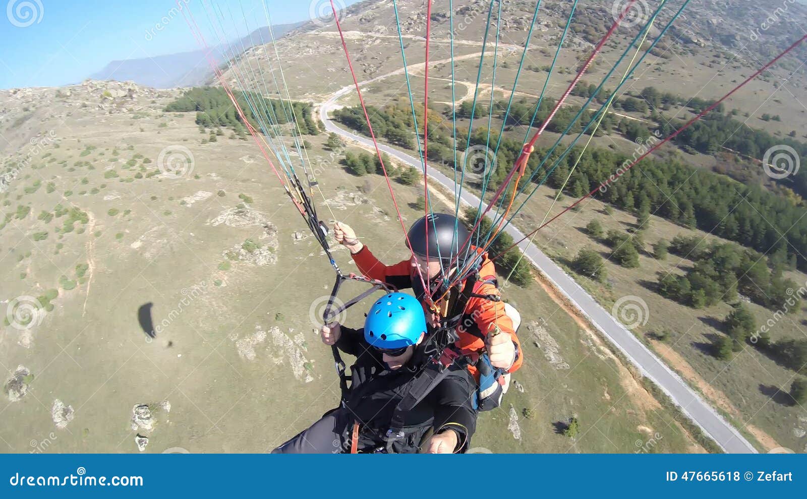 Paragliding over mountain stock photo. Image of athlete - 47665618