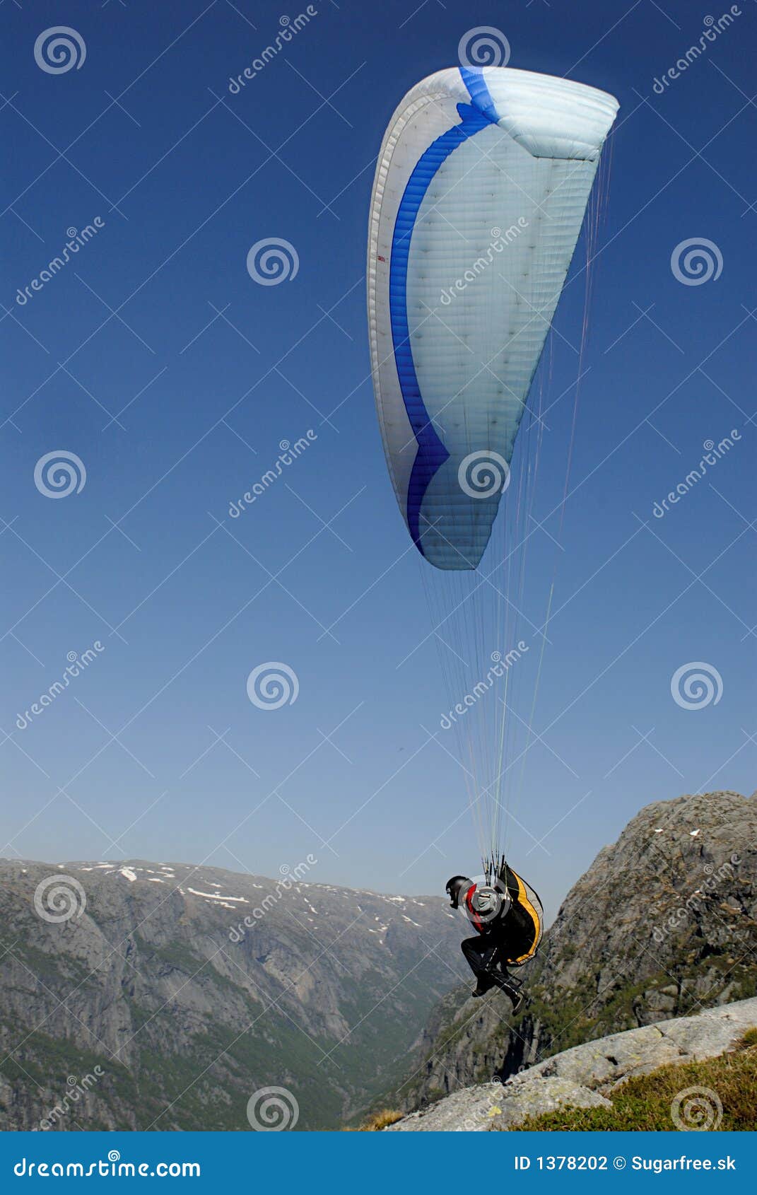 Paragliding over mountains stock photo. Image of flying - 1378202