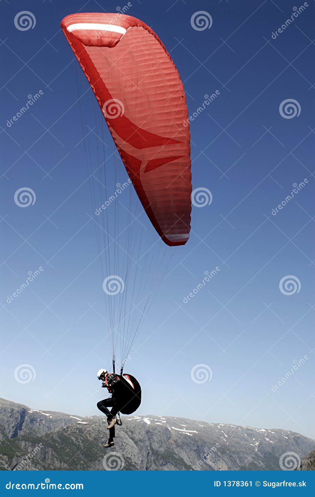 Paragliding over mountains stock image. Image of gliding - 1378361
