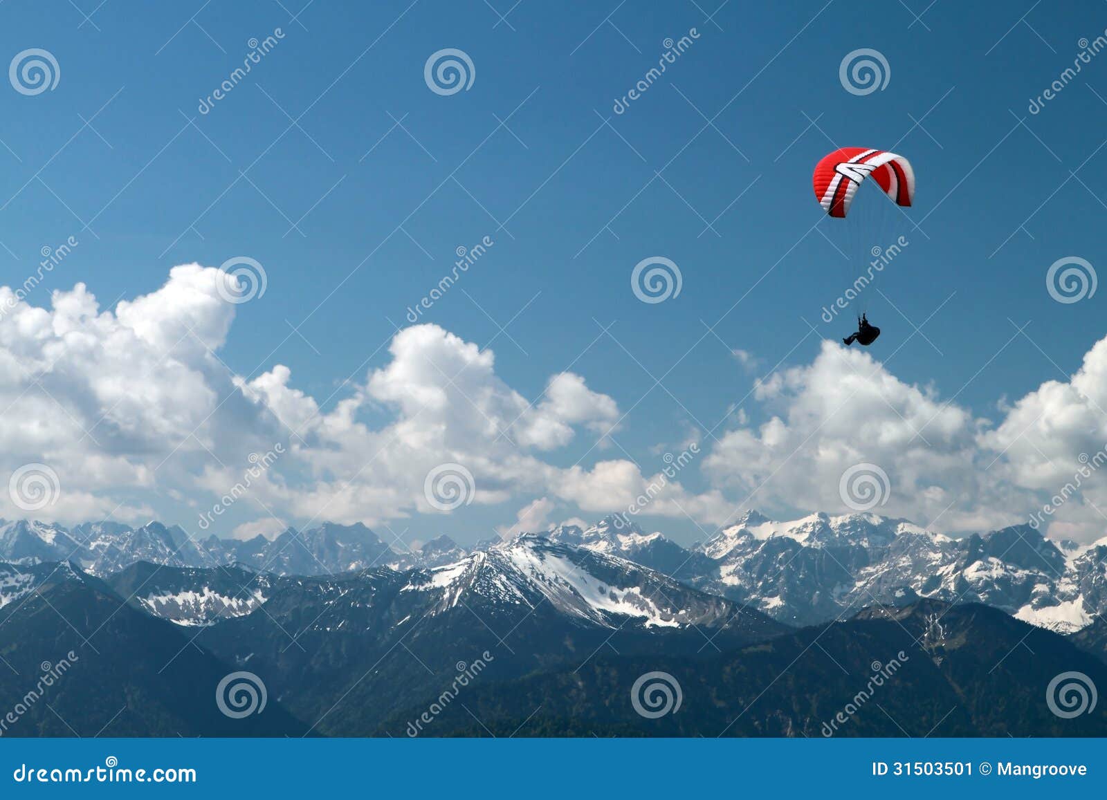 Paragliding over mountains stock image. Image of glide - 31503501
