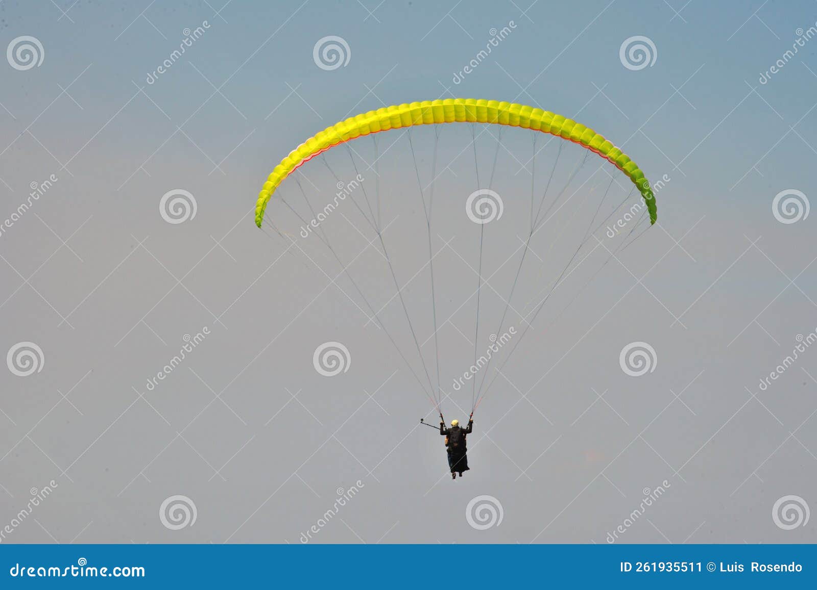 Paragliding Over the Ocean in the Bright Daylight Blue Sky Stock Image ...