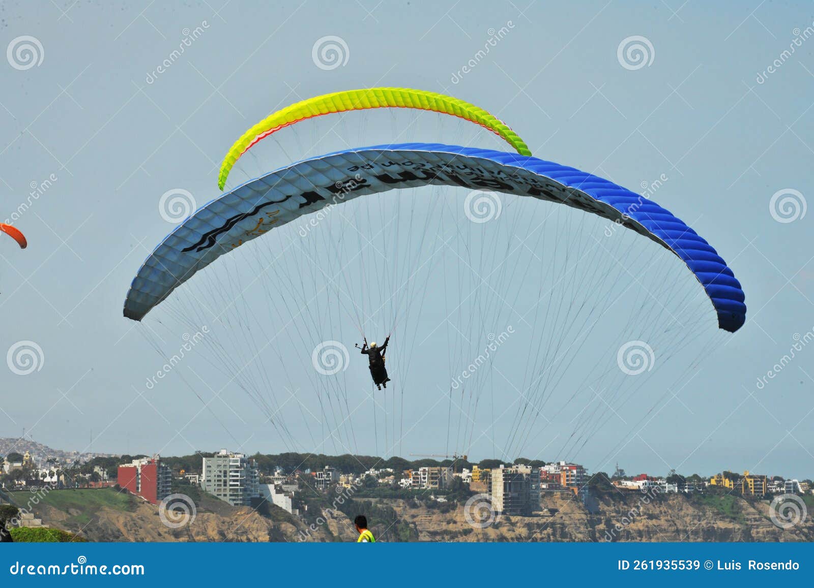 Paragliding Over the Ocean in the Bright Daylight Blue Sky Stock Image ...
