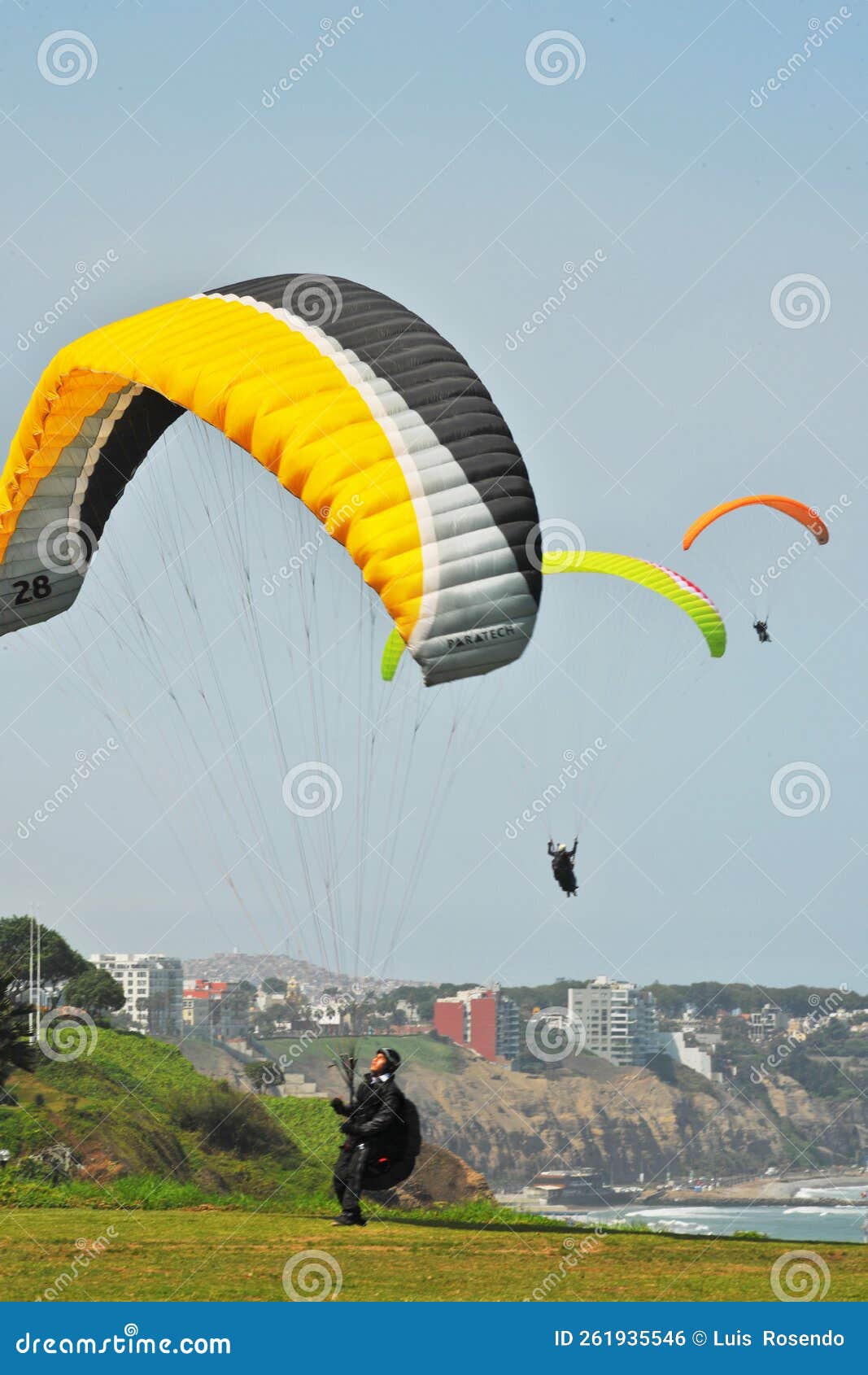 Paragliding Over the Ocean in the Bright Daylight Blue Sky Editorial ...