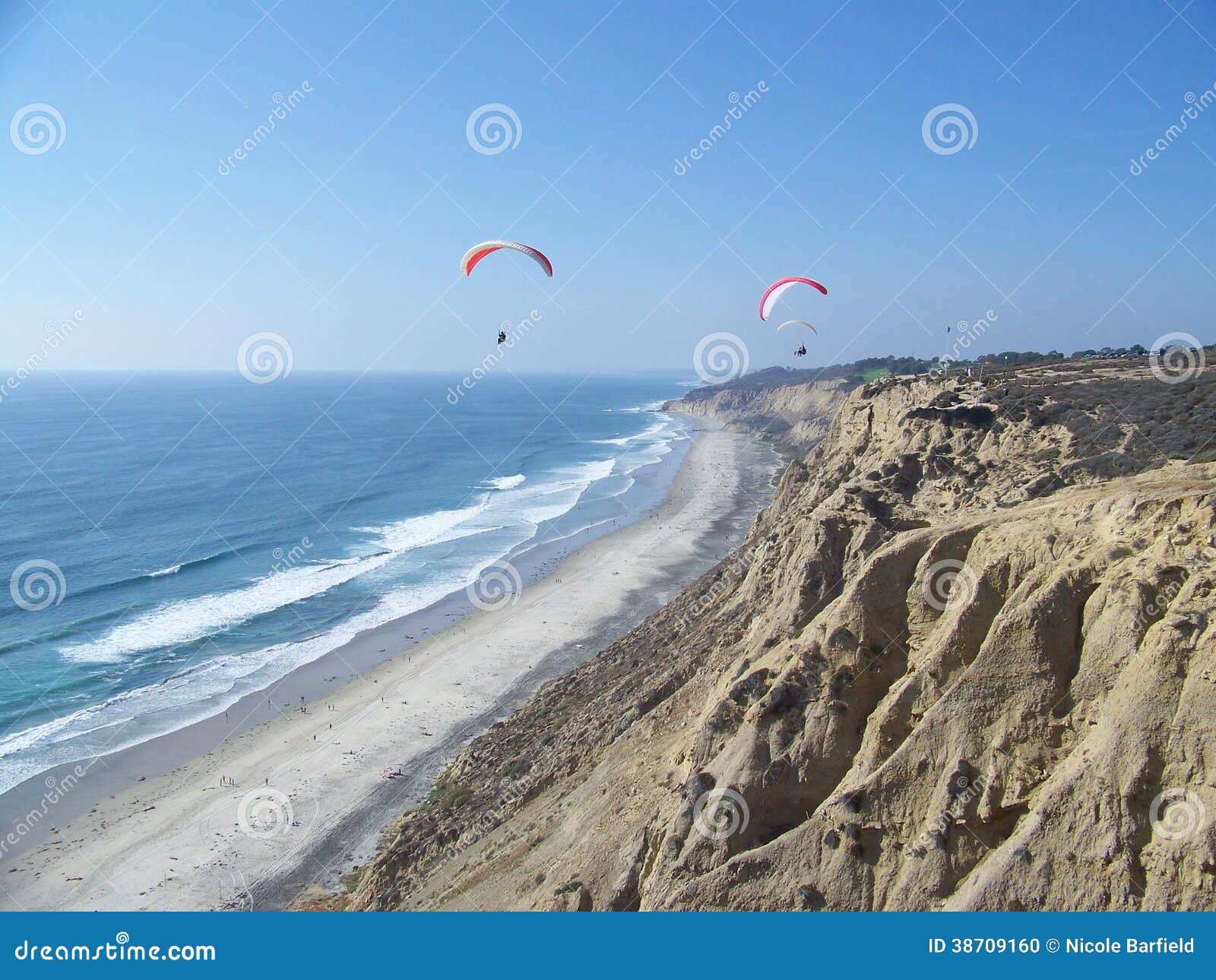 Paragliding the Pacific Coast Stock Photo - Image of landscape, surf ...