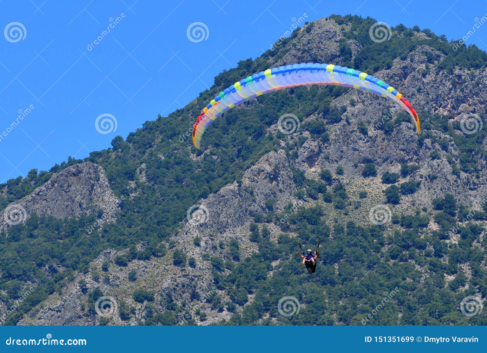 Paragliding. Paragliders on a Blue Sky and Mountains Background Stock ...