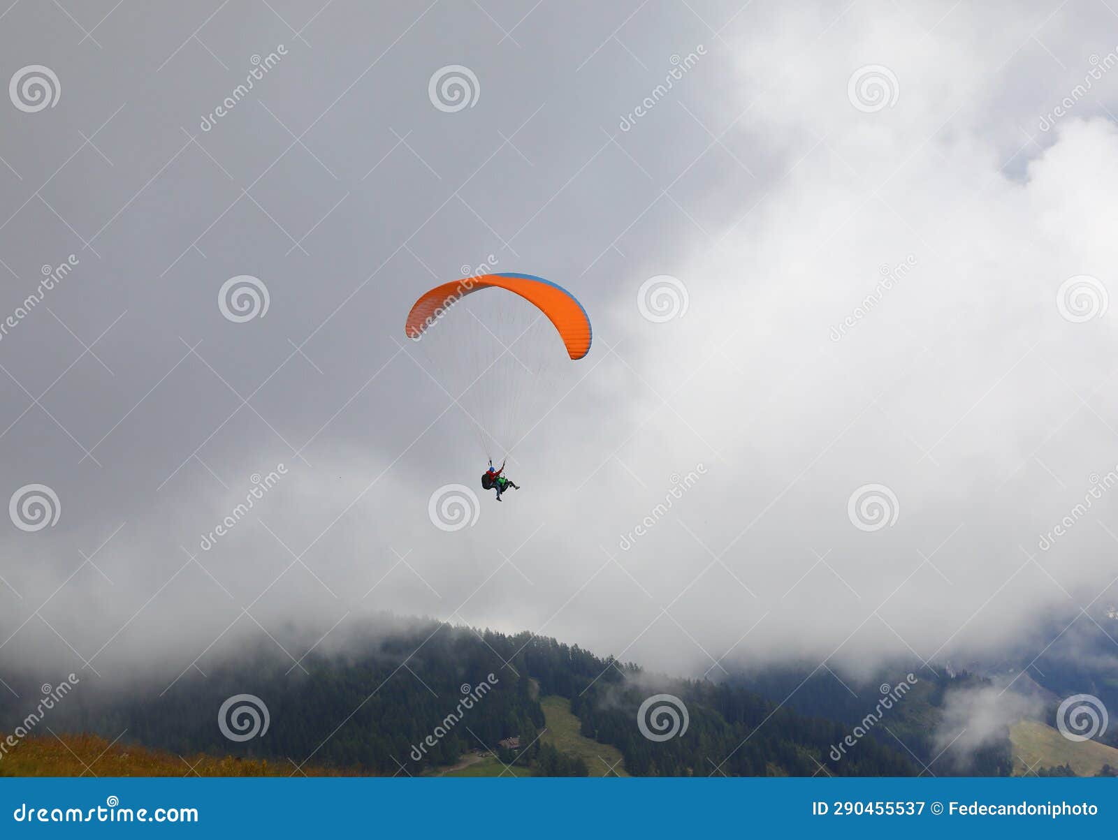 Paragliding with Two People on Board for a Couple Flight and the Clouds ...