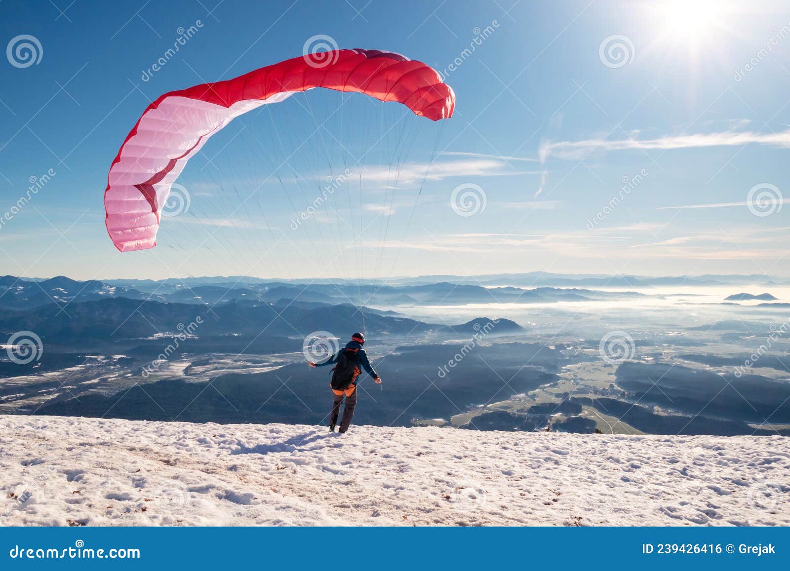 Paragliding in Winter at Mountains Stock Photo - Image of people ...