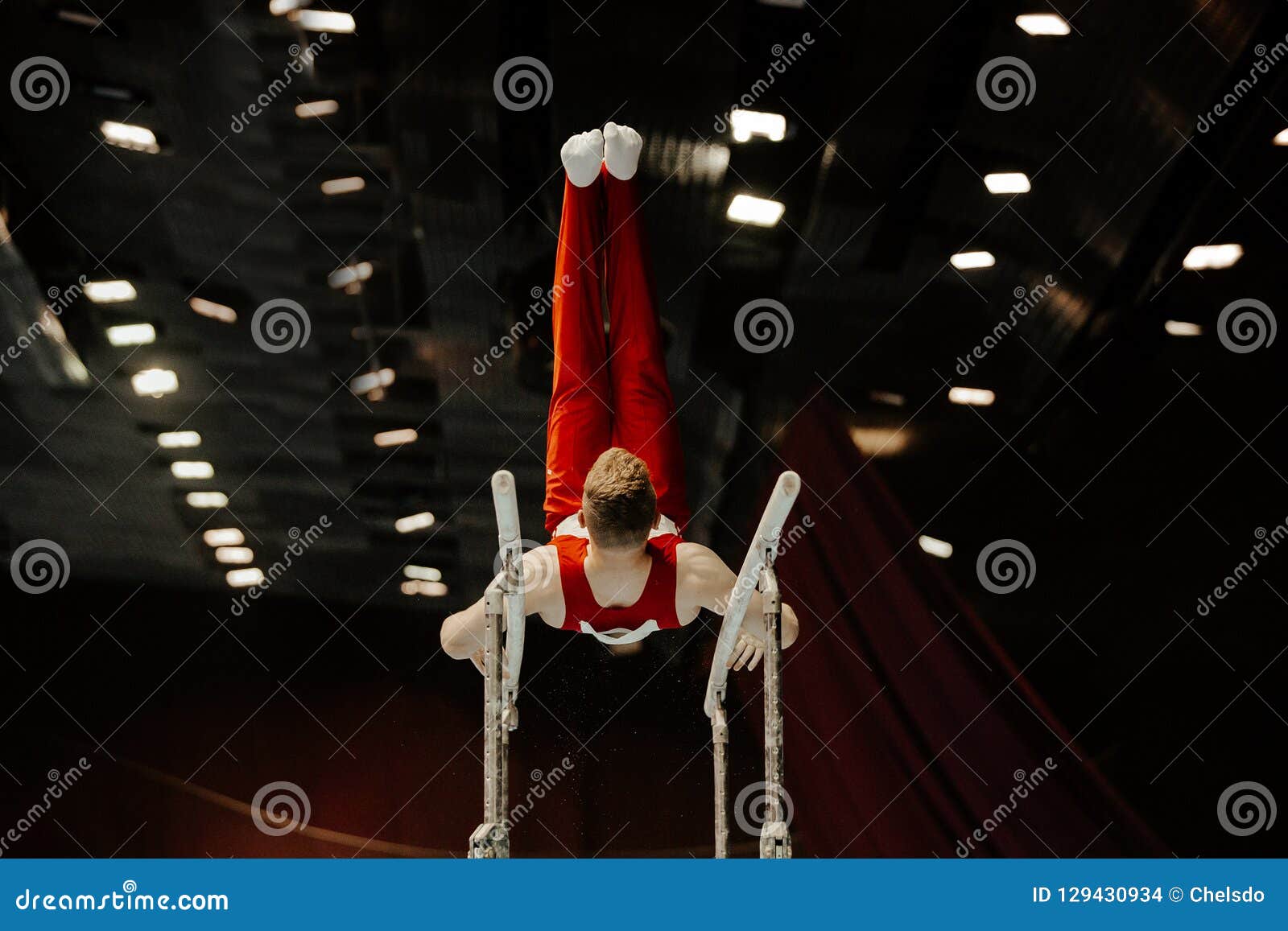 Parallel bars male gymnast editorial stock image. Image of ...