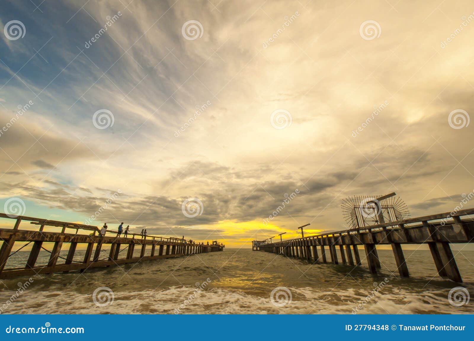 Parallel Concrete Piers on Beach and Sea Wave Stock Photo - Image of structure, dusk: 27794348