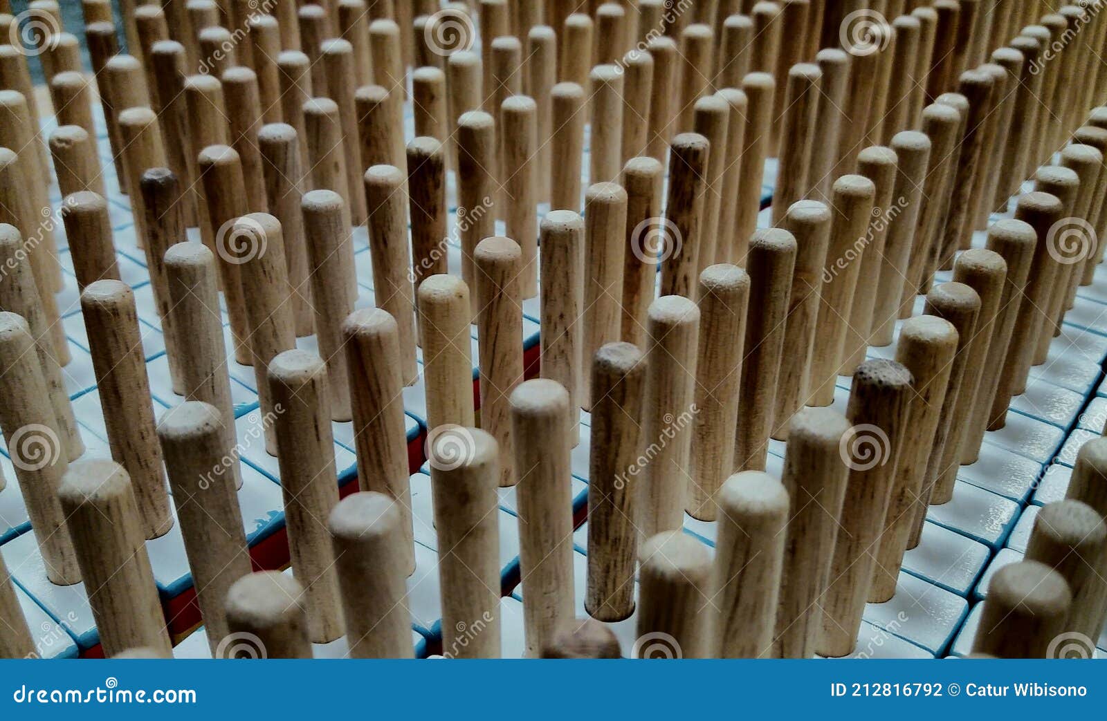 Parallel Rows of Long Wooden Dowels Stock Photo - Image of parallel ...