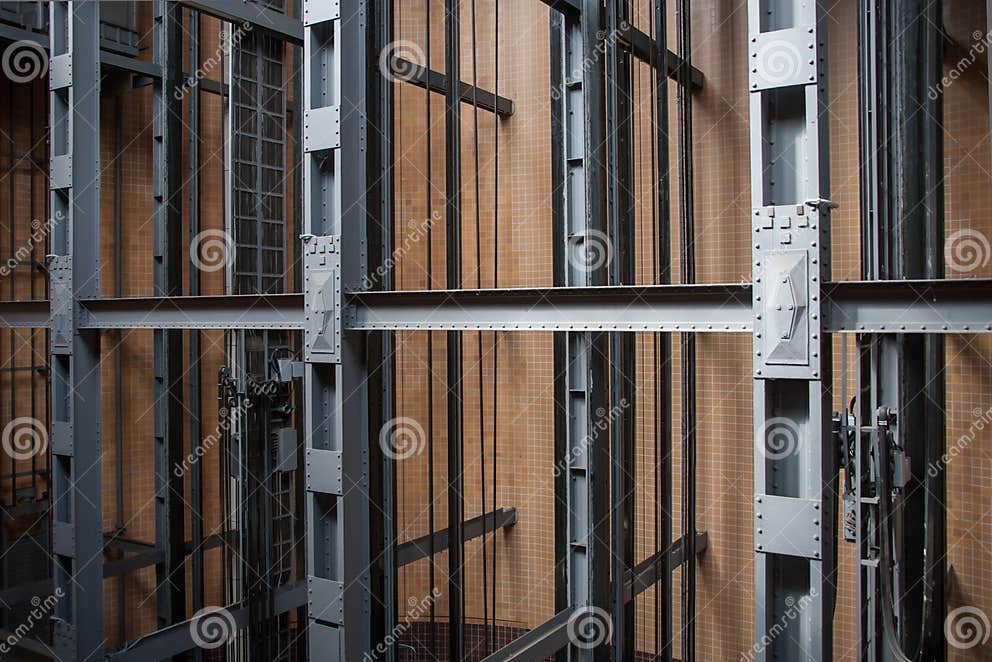 Parallel Steel Columns with Brick Background Stock Photo - Image of ...