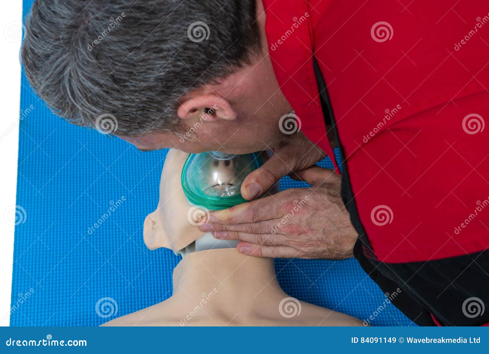 Paramedic Blowing Oxygen To Dummy Stock Image - Image of dummy ...