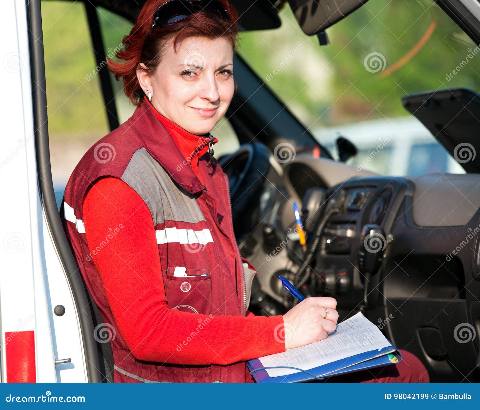 Paramedic Female Writing in Emergency Car Stock Image - Image of ...