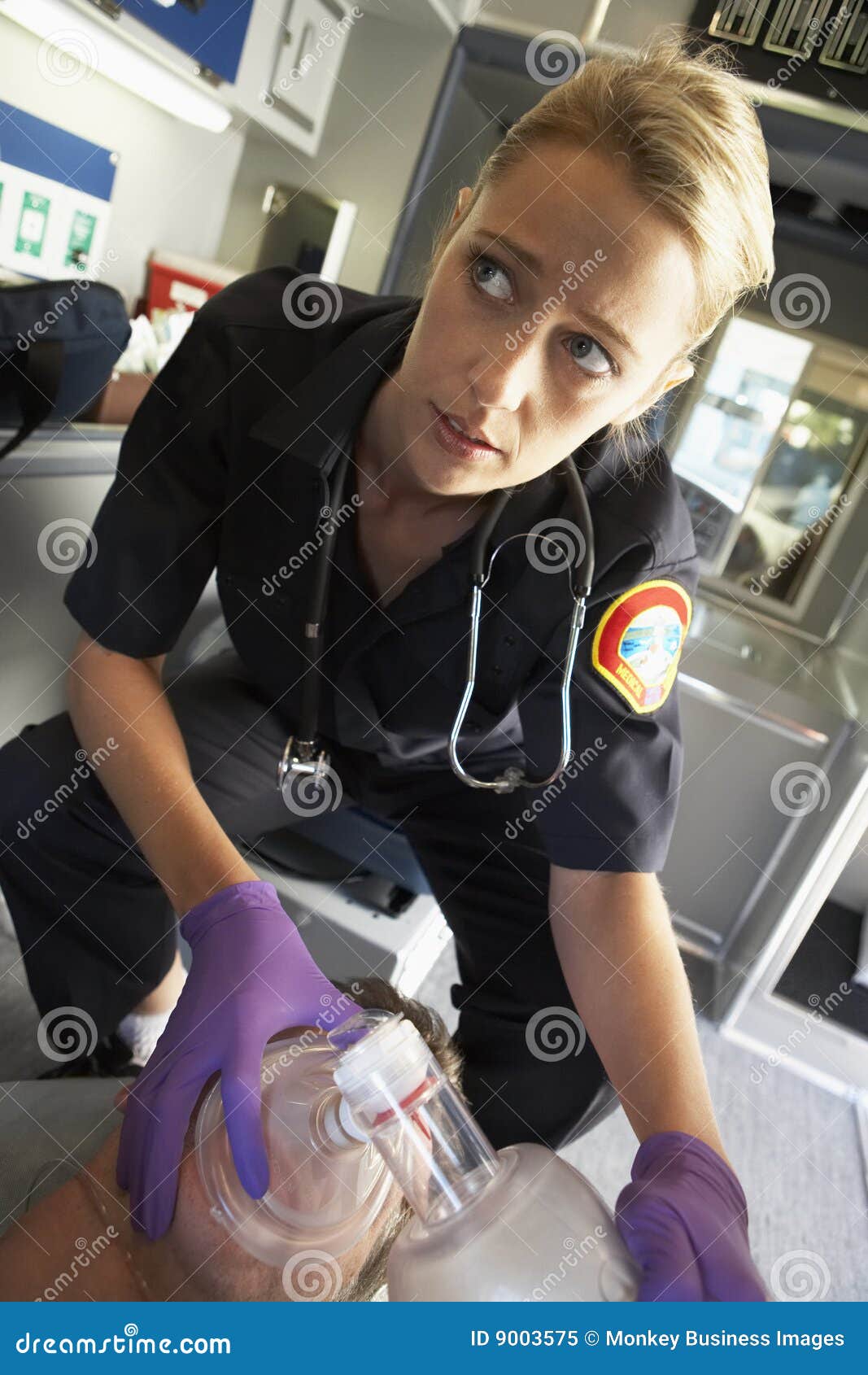 Paramedic Holding Oxygen Mask Over Patient S Face Stock Image - Image ...