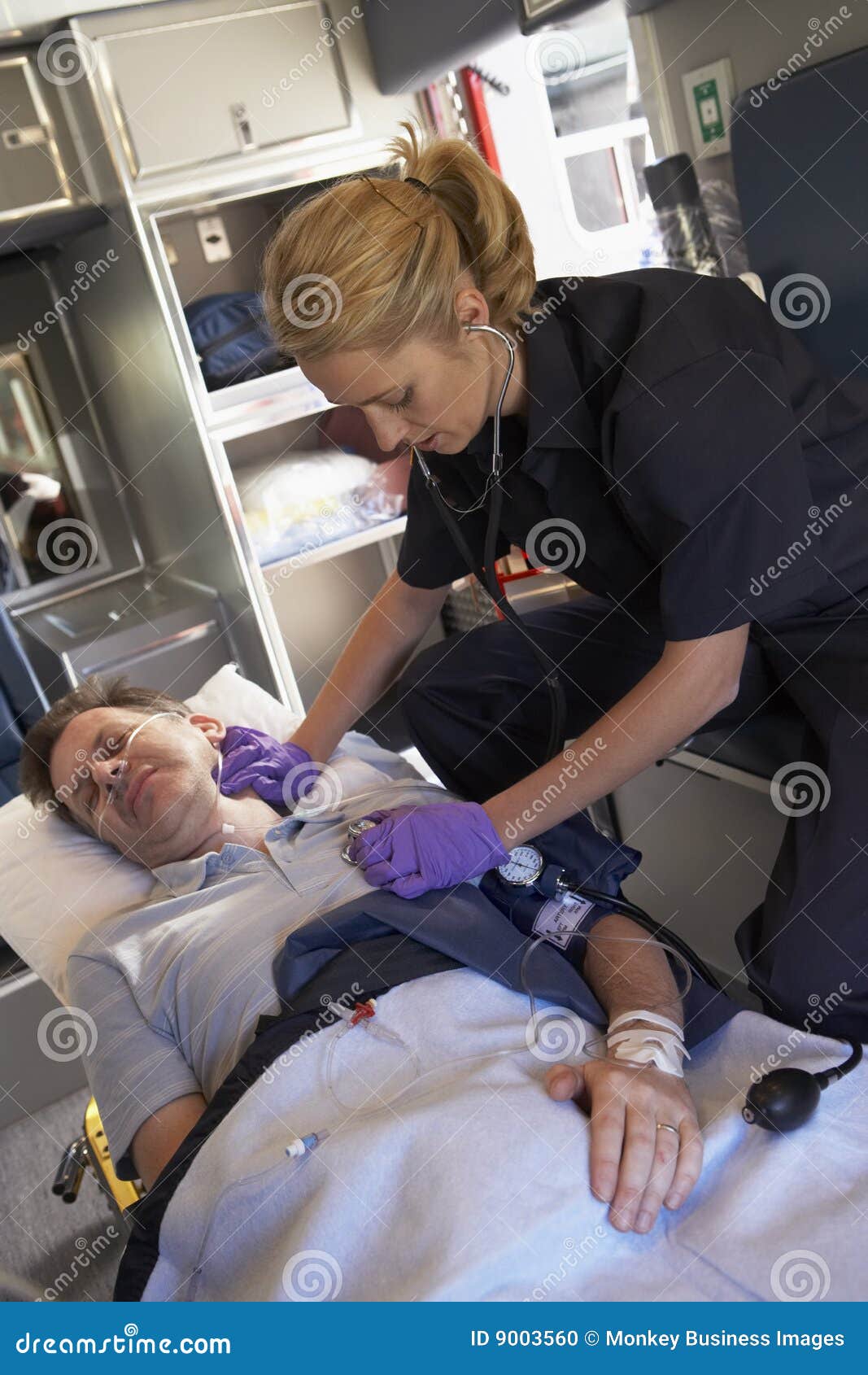 Paramedic with Patient in Ambulance Stock Photo - Image of caucasian ...