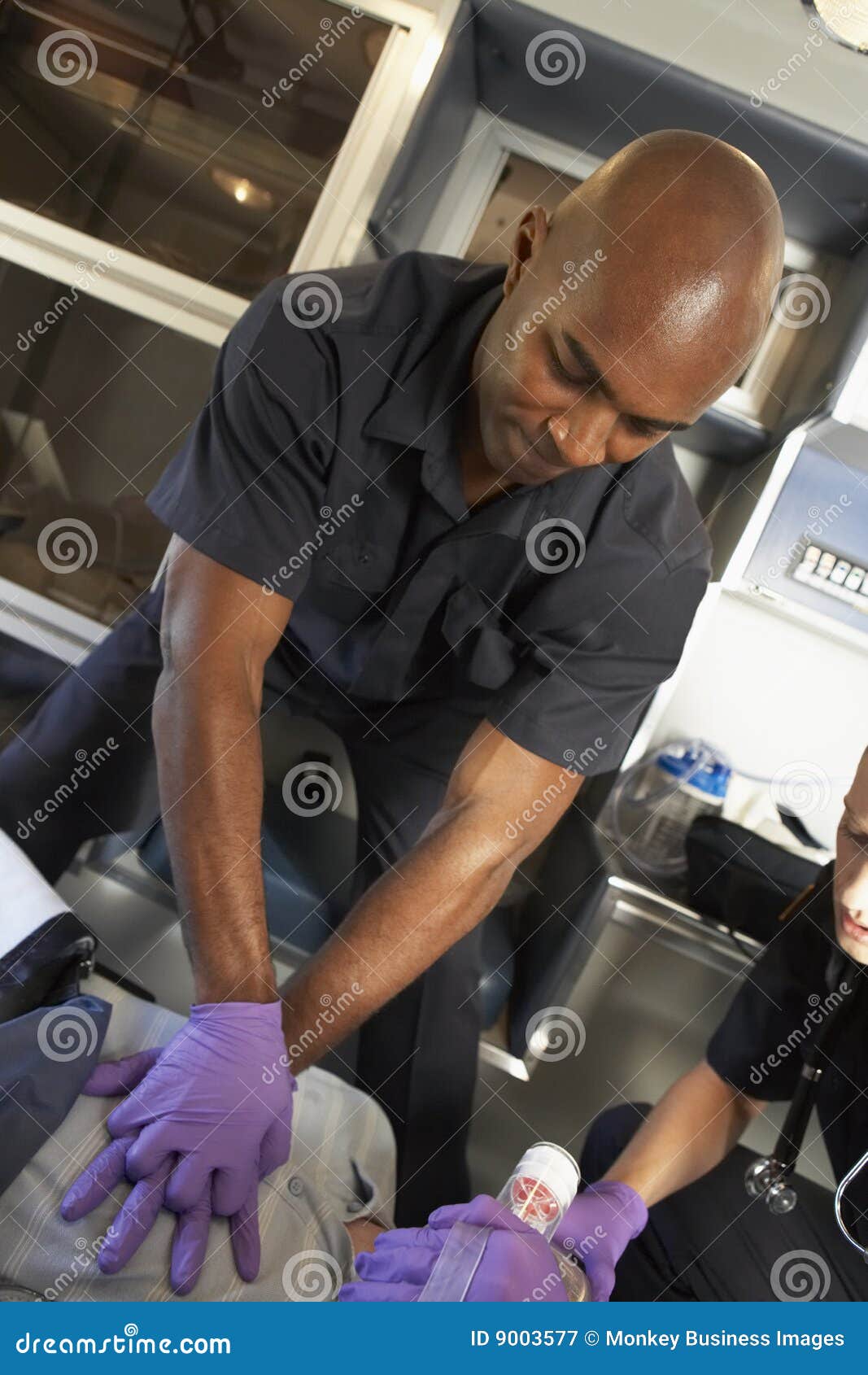 Paramedic Performing CPR on Patient Stock Image - Image of oxygen ...