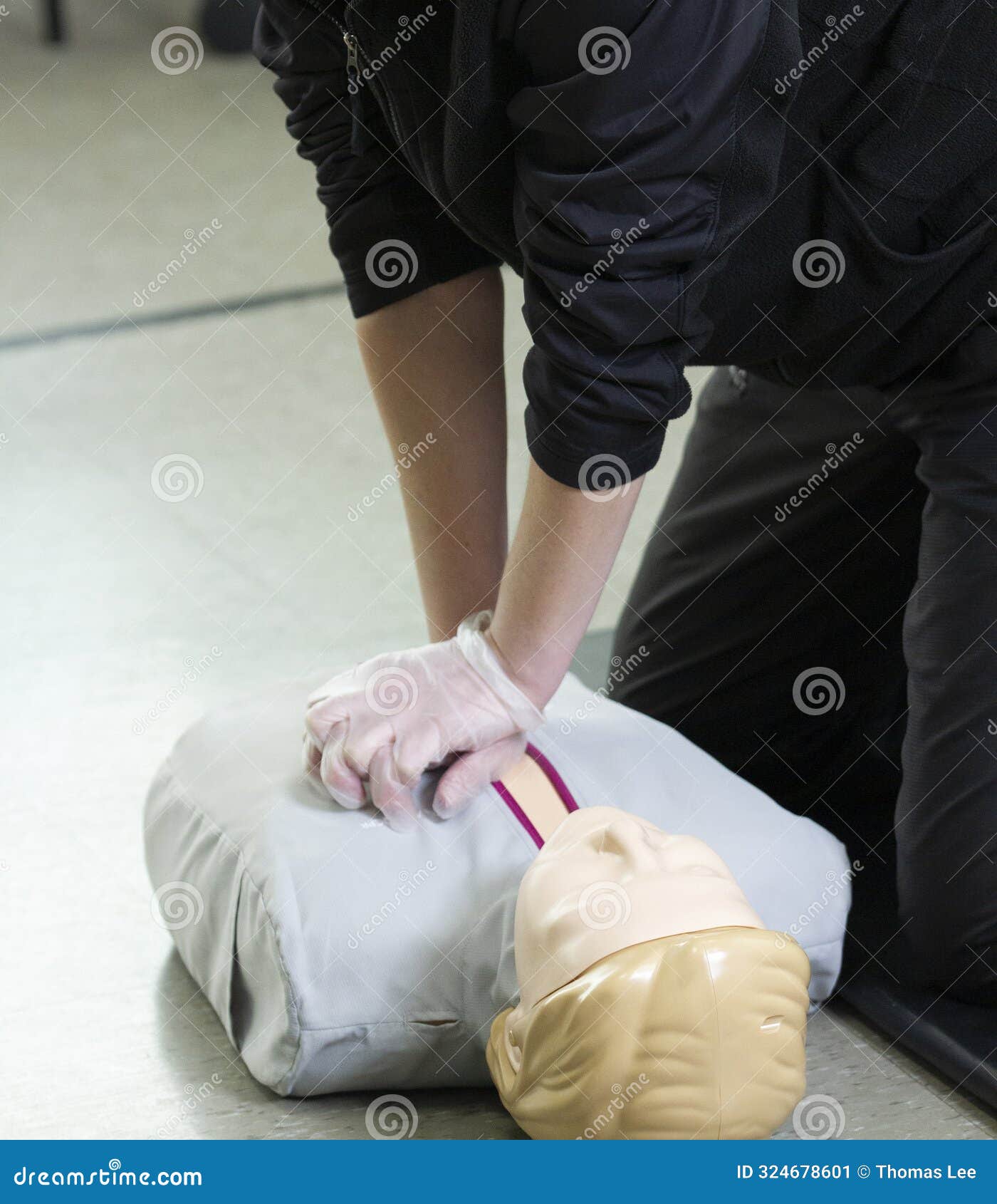First Response Worker Demonstrates CPR and Proper Defibrillator ...