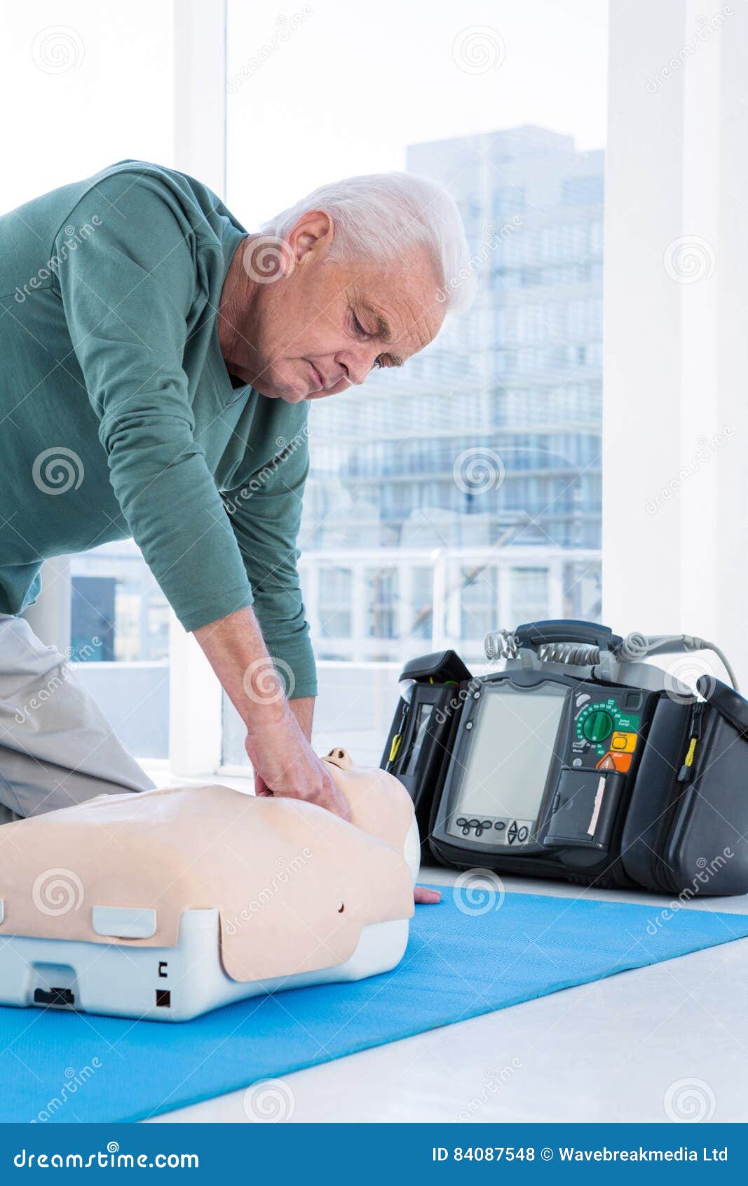 Paramedic Practicing Resuscitation on Dummy Stock Photo - Image of ...