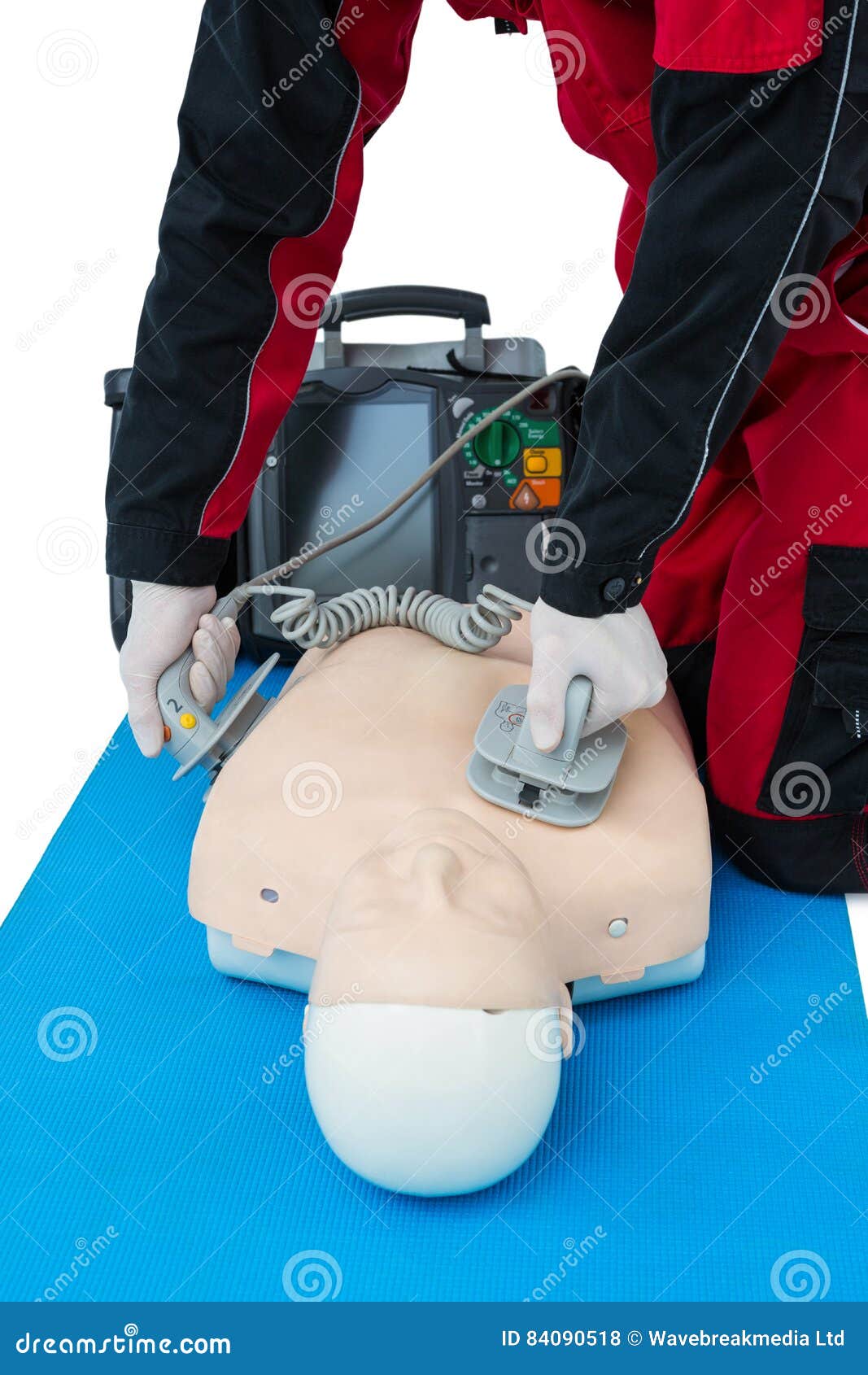 Paramedic Practising Resuscitation Mouth To Mouth On Dummy Royalty-Free ...