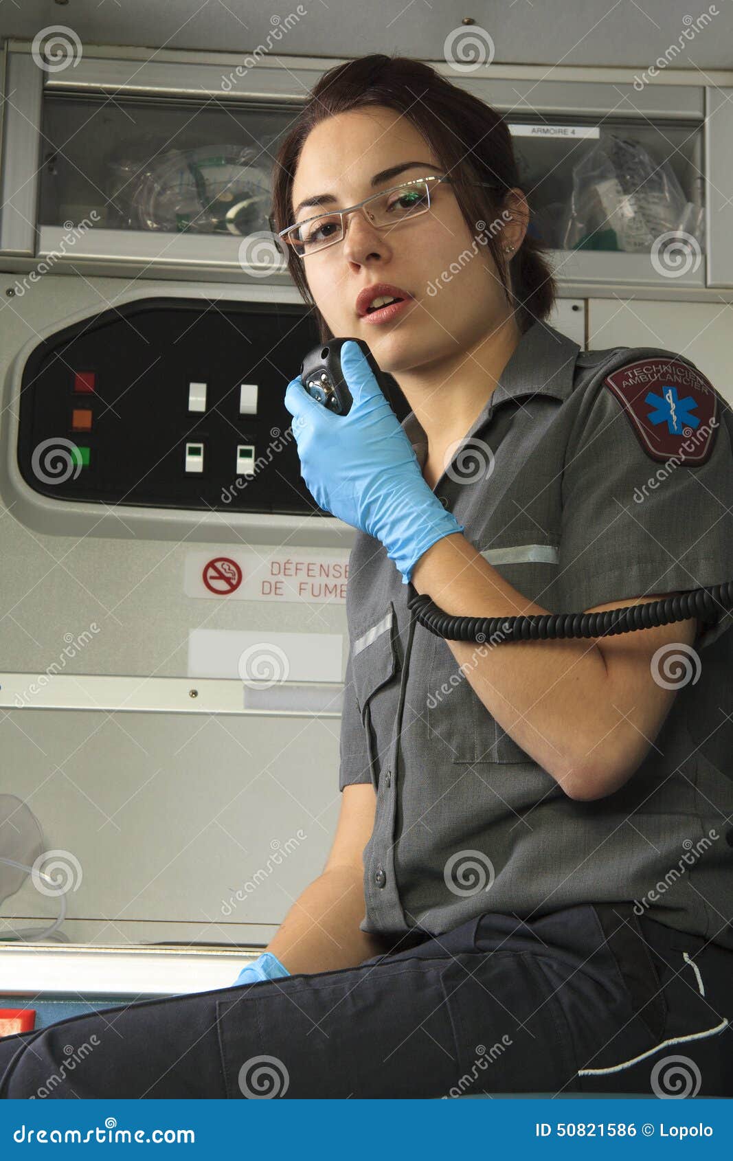 A Paramedic Speaking on Microphone Stock Photo - Image of paramedic ...