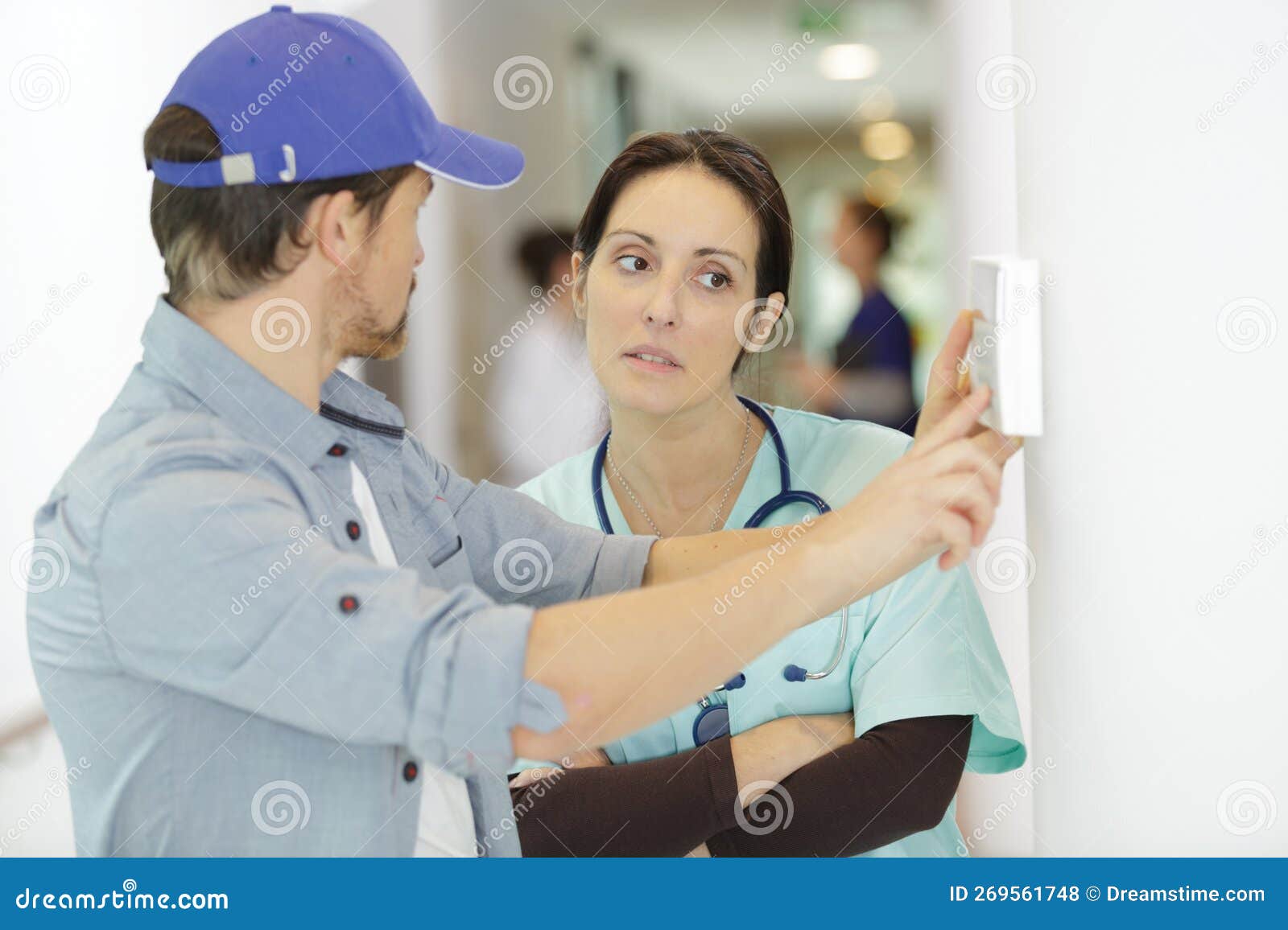 Paramedic Talking To Construction Worker Stock Photo - Image of danger ...