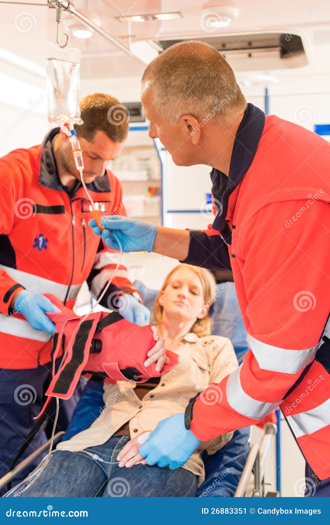 Paramedics in Ambulance with Patient Broken Arm Stock Image - Image of ...