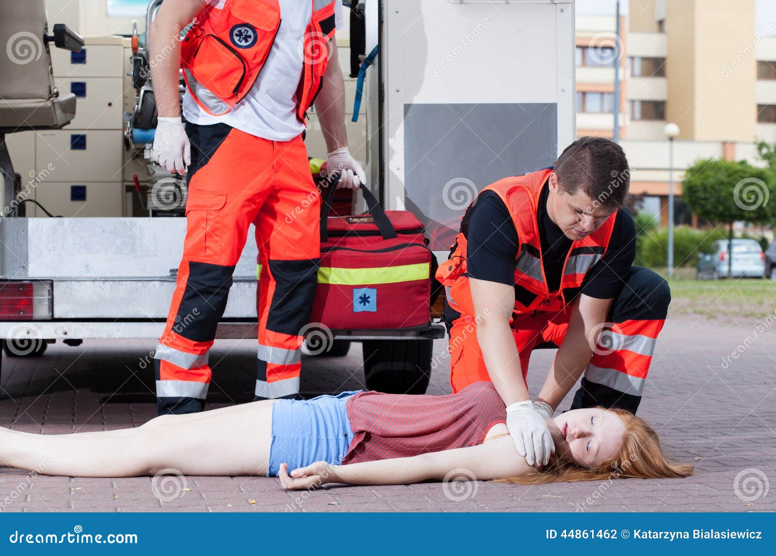 Paramedics Applying First Aid Stock Photo - Image of clear, patient ...