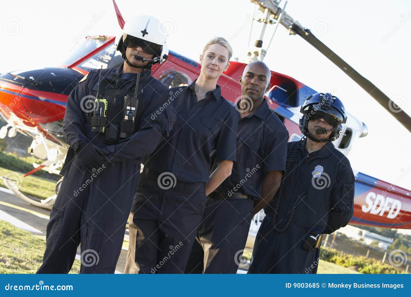 Paramedics and Crew in Front of Helicopter Stock Image - Image of ...