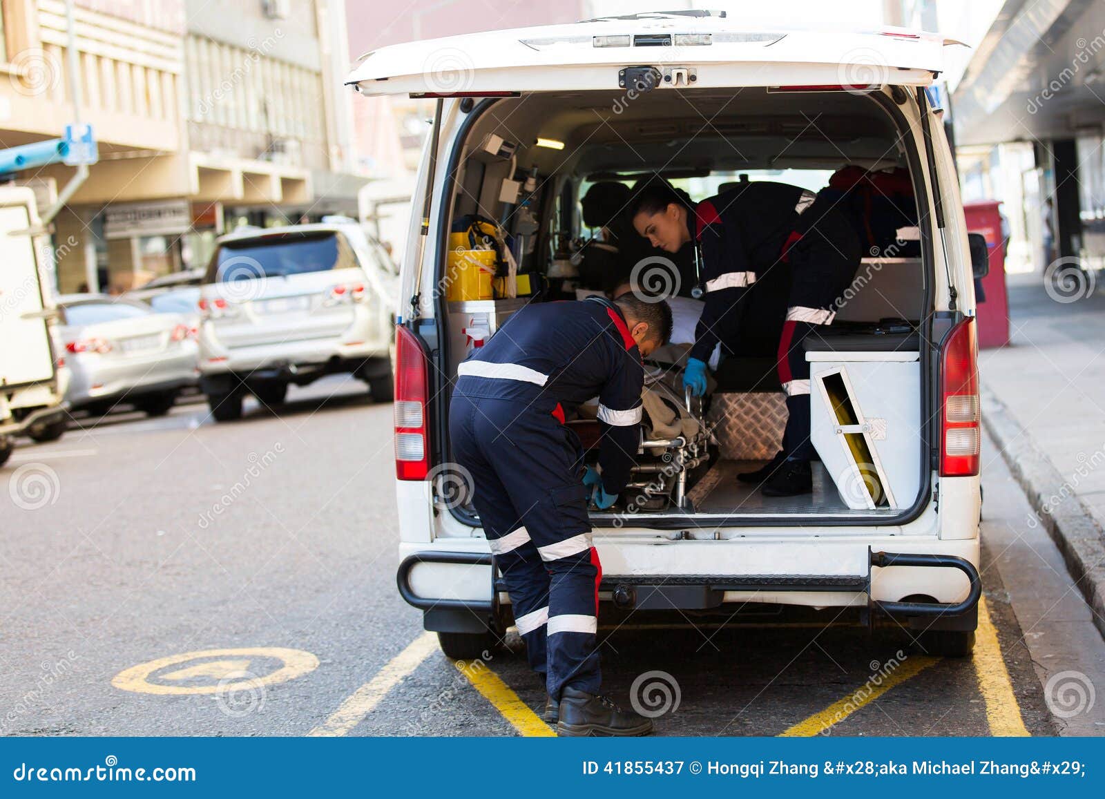 Paramedics Offloading Patient Stock Image - Image of emergency, service ...