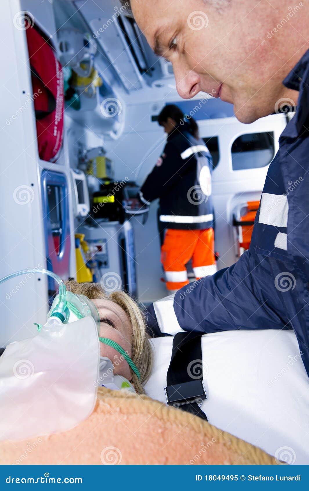 Paramedics with Patient stock image. Image of lying, high - 18049495