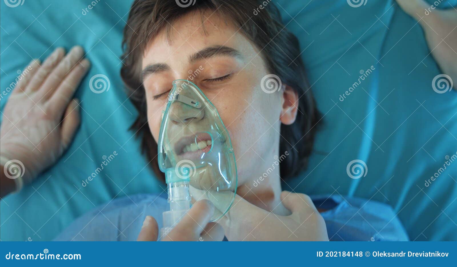 Paramedics Putting On Oxygen Inhalation Mask On Girl Face While Trying