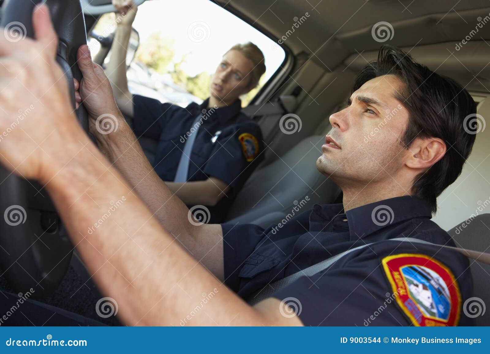 Paramedics Responding To Emergency in Ambulance Stock Photo - Image of ...