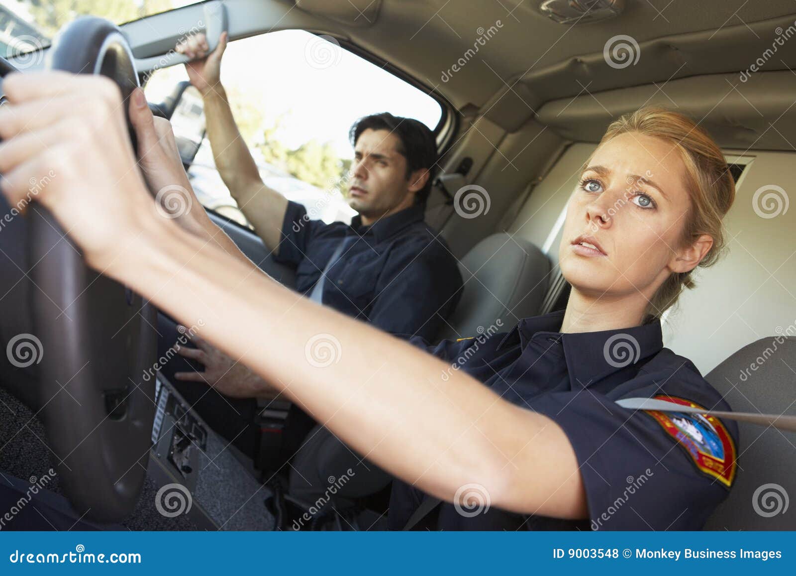 Paramedics Responding To Emergency in Ambulance Stock Photo - Image of ...