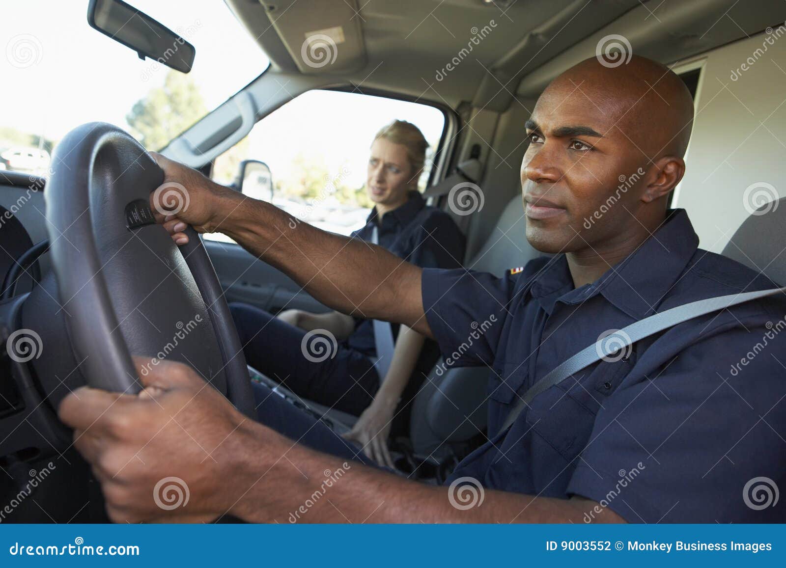 Paramedics Responding To Emergency in Ambulance Stock Photo - Image of ...
