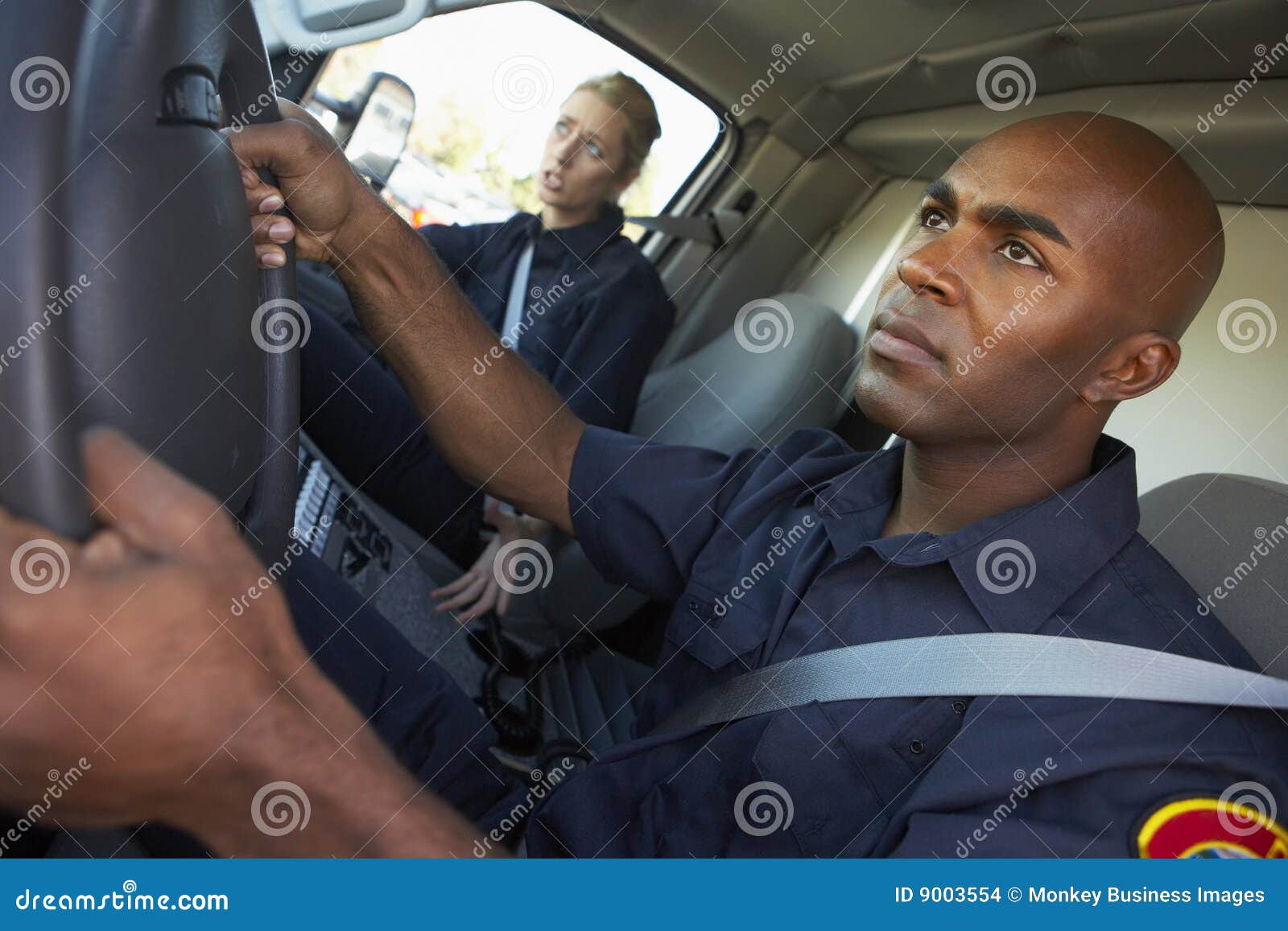 Paramedics Responding To Emergency in Ambulance Stock Photo - Image of ...