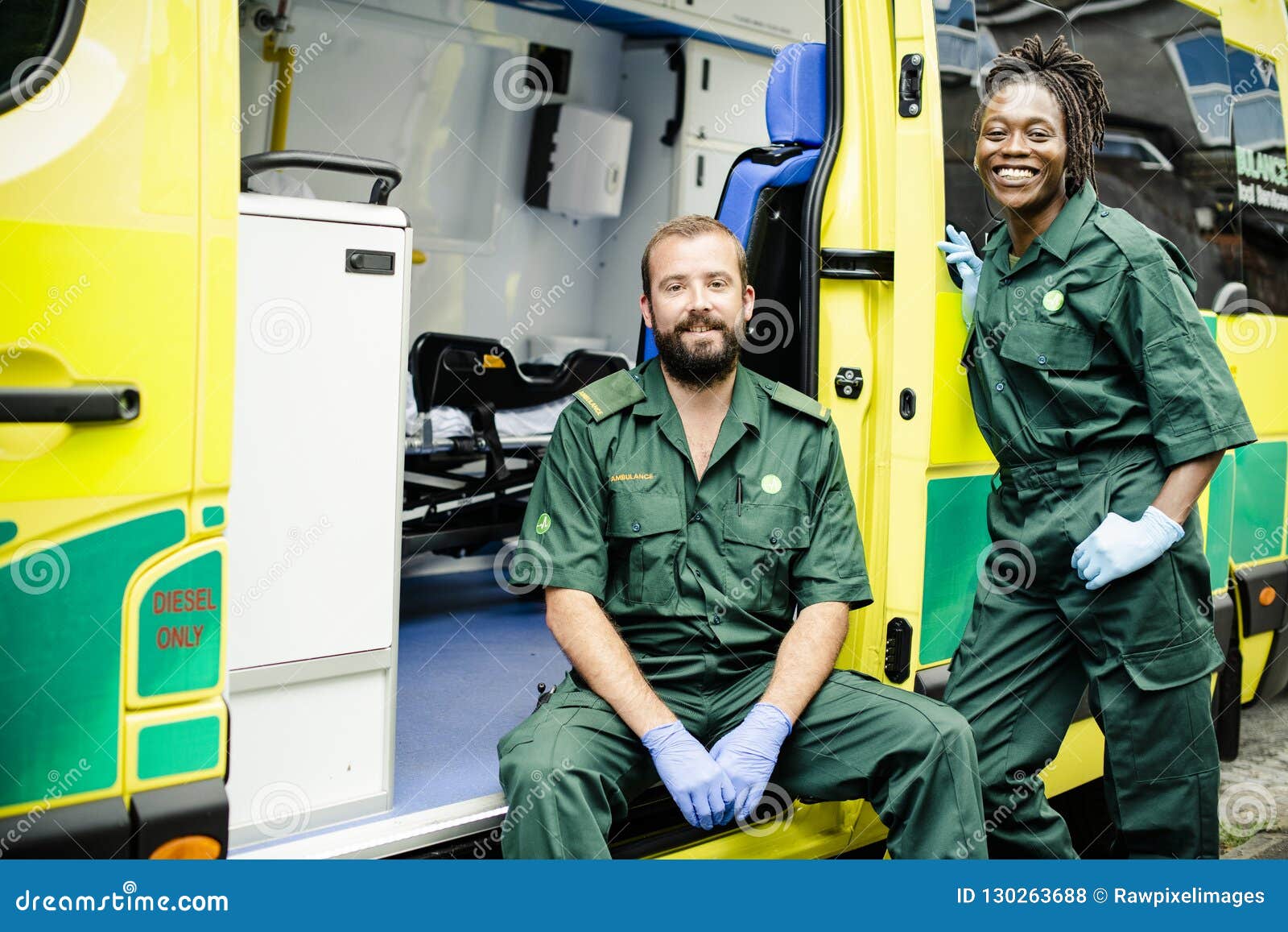 Paramedics Team with an Ambulance Stock Photo - Image of green ...