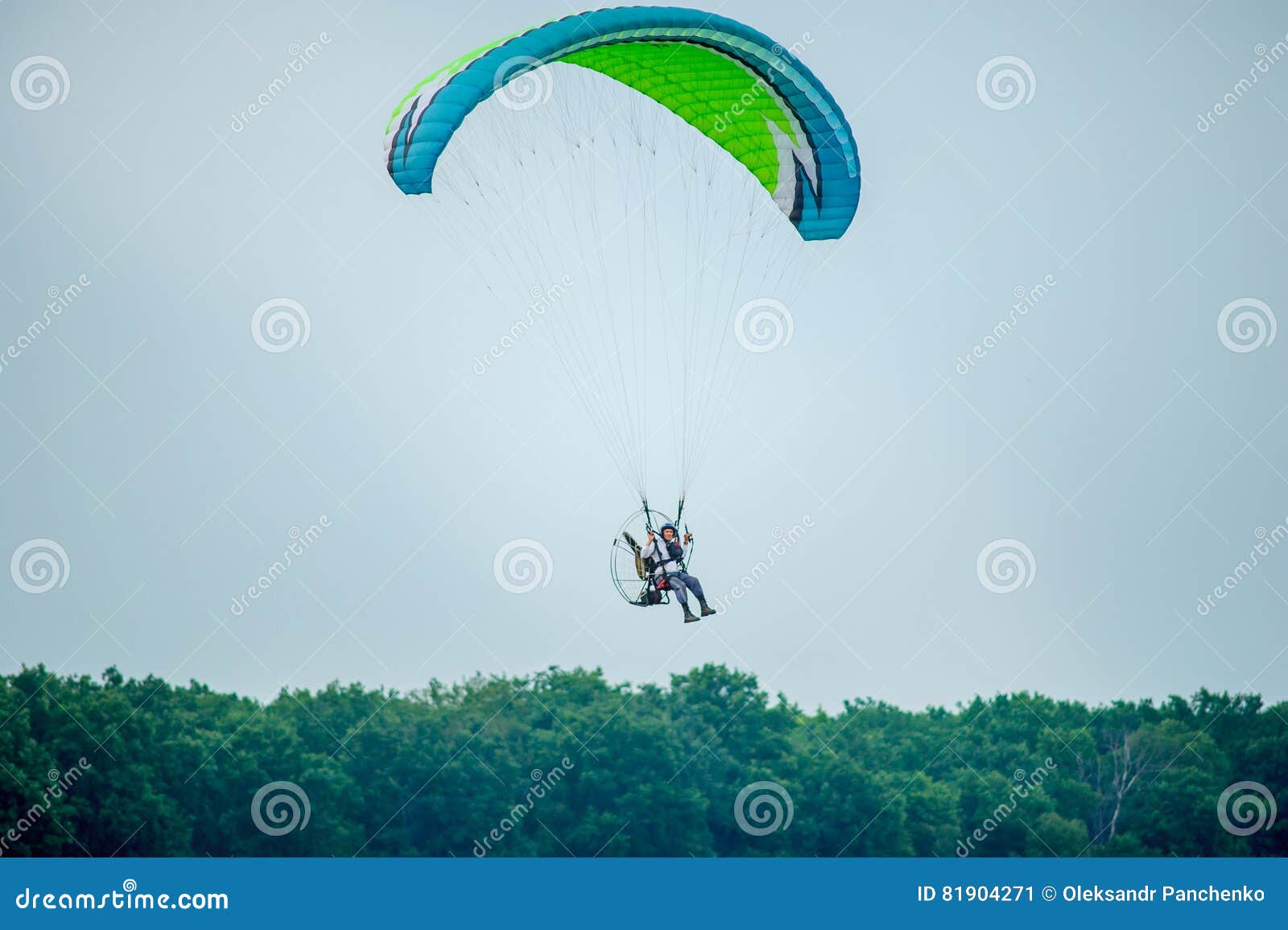Paramotor Flying in the Air Over the Forest Editorial Photo - Image of ...
