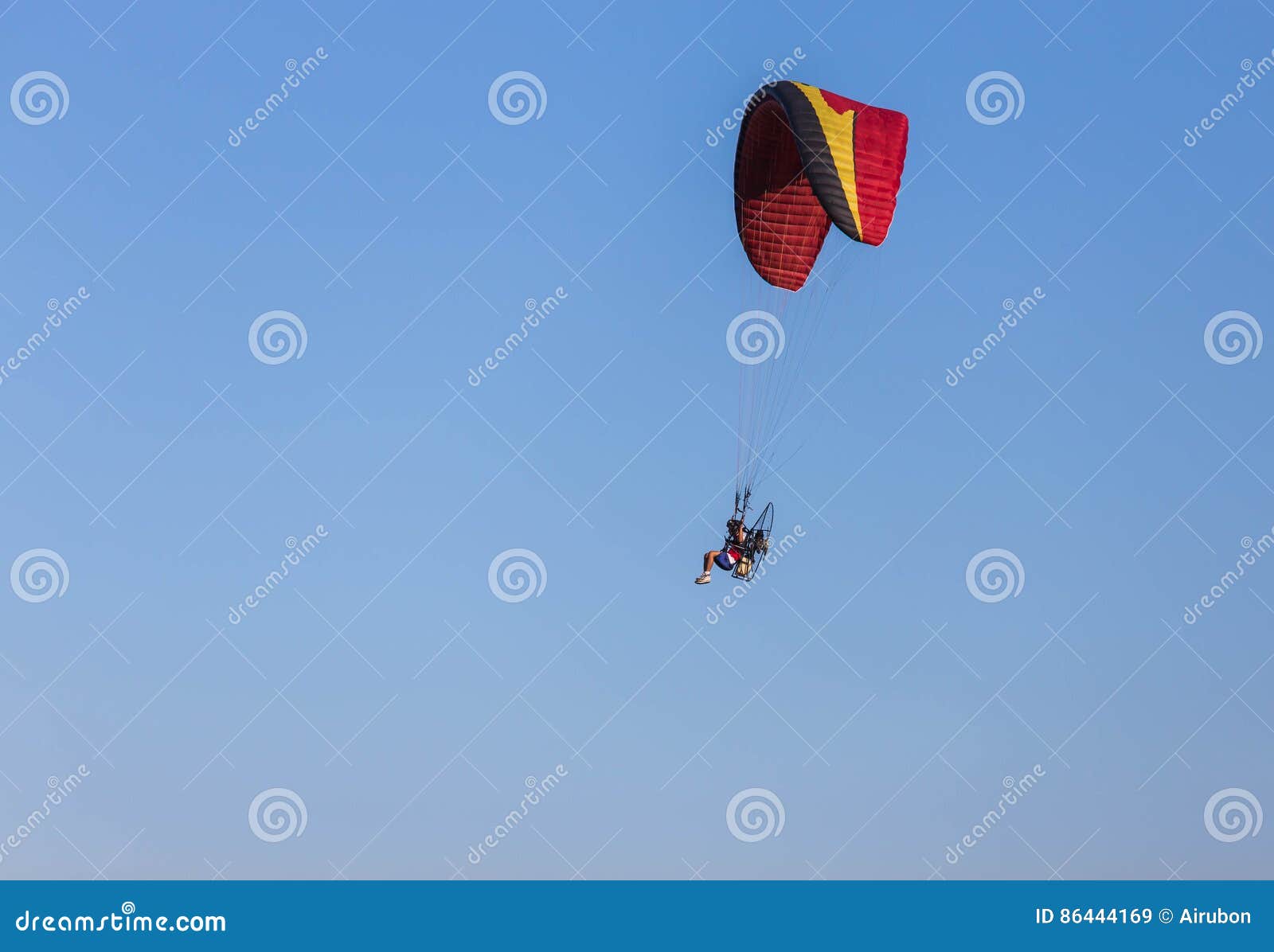 Paramotor Flying on Blue Sky Background Editorial Stock Image - Image ...