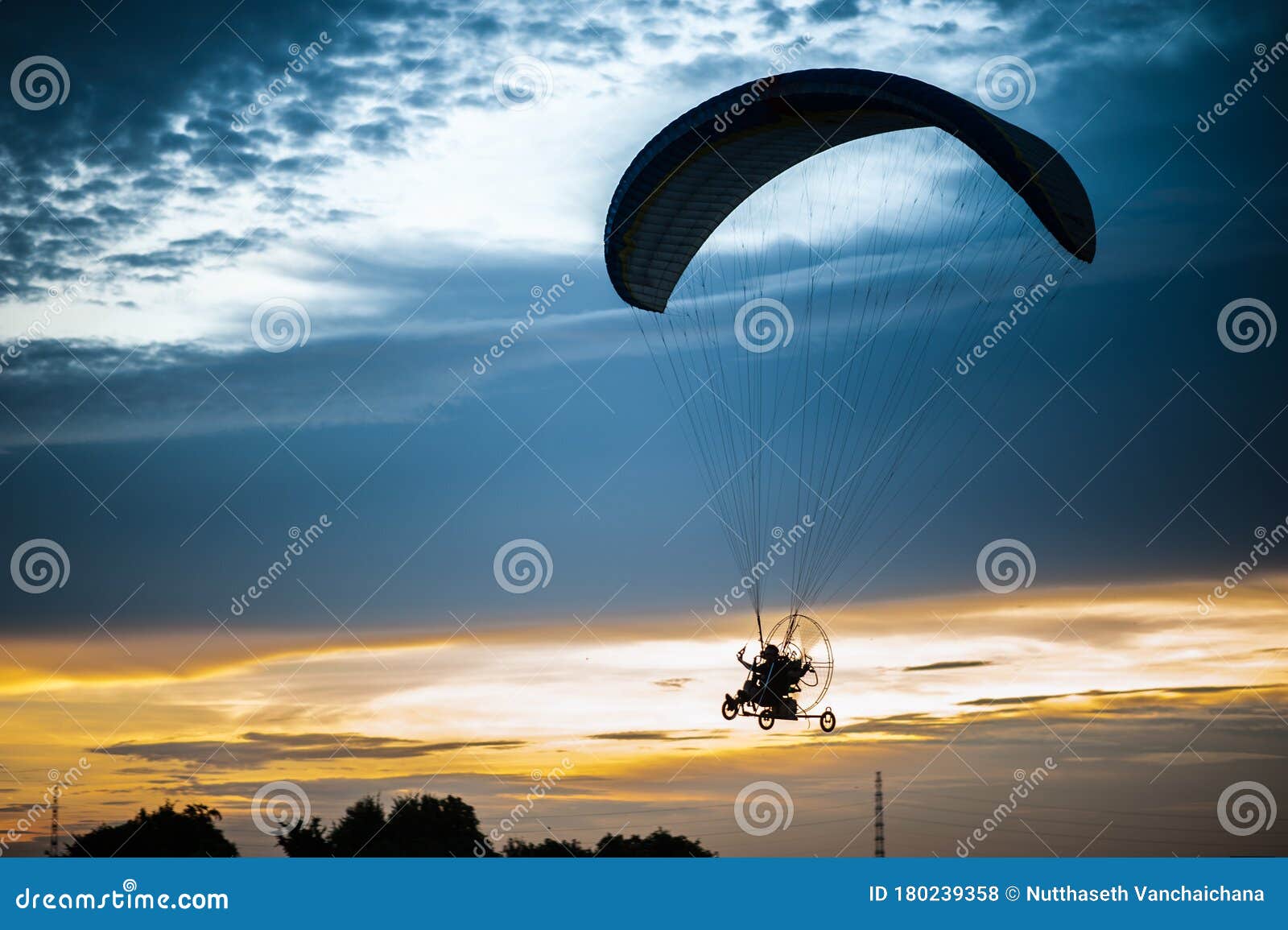 Paramotor Flying On Blue Sky Background Royalty-Free Stock Photography ...