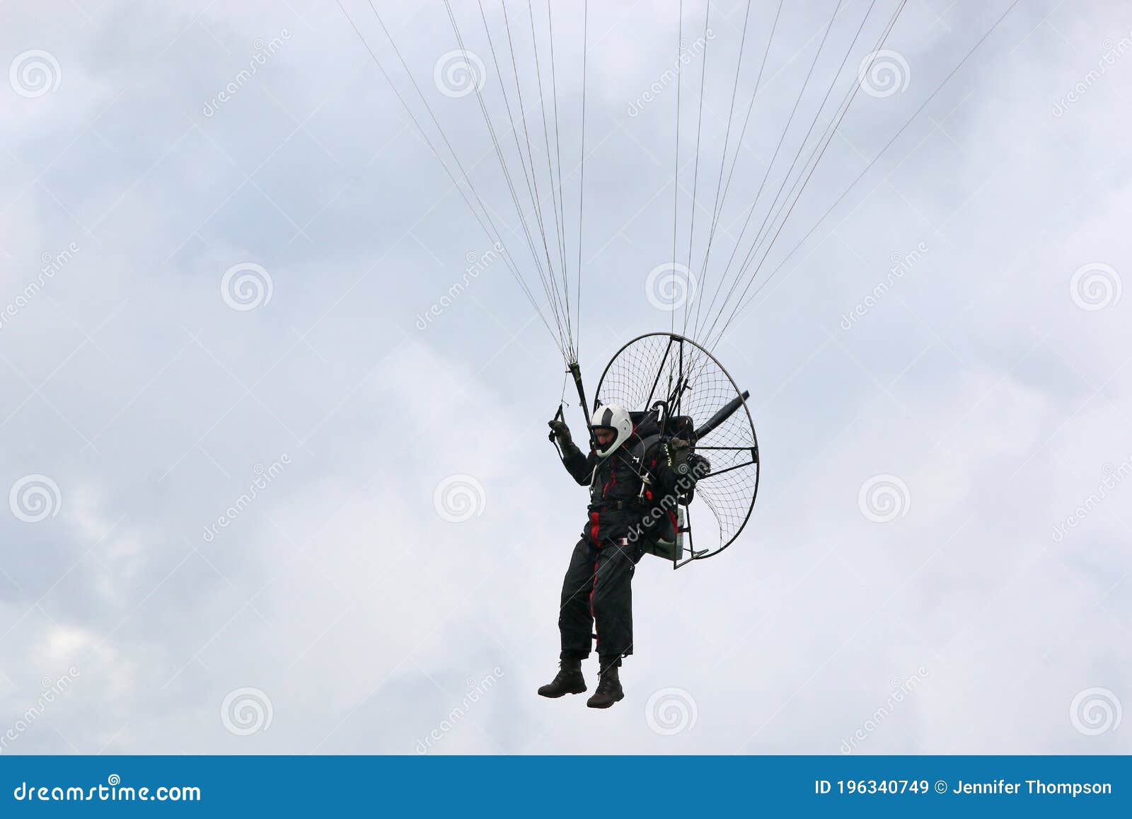 Paramotor Pilot Coming in To Land Stock Image - Image of paramotor ...