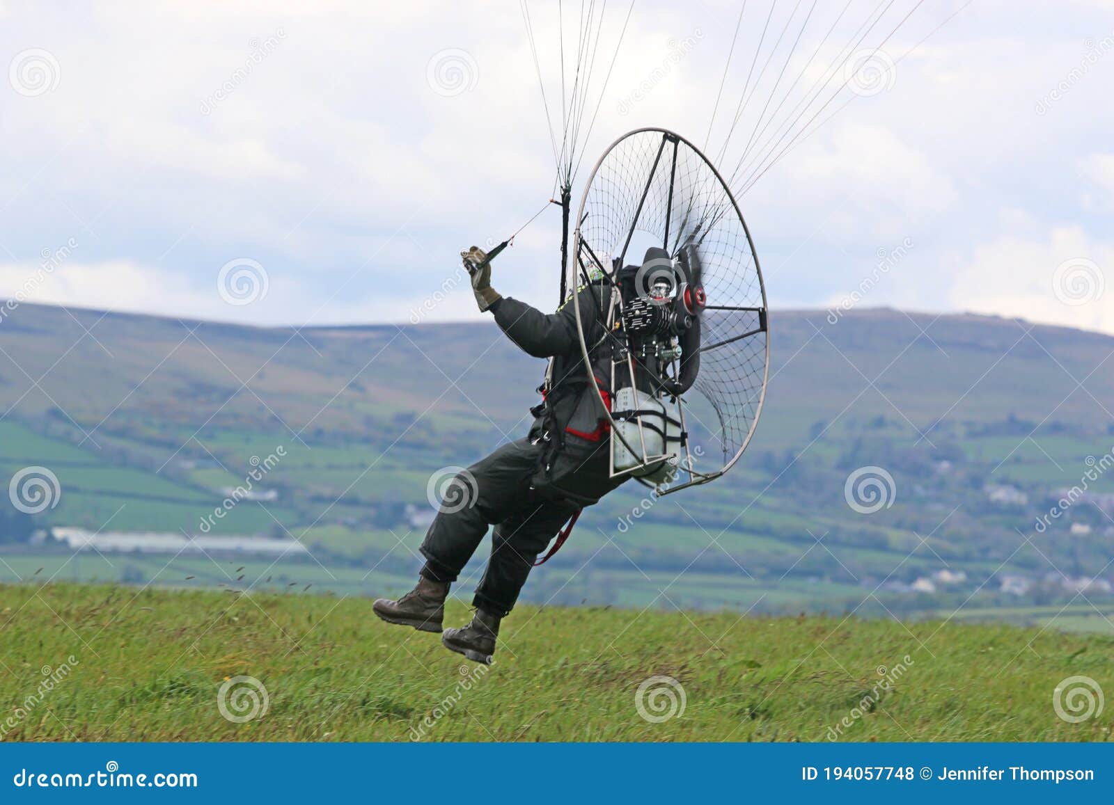 Paramotor Pilot Landing in a Field Stock Photo - Image of recreation ...