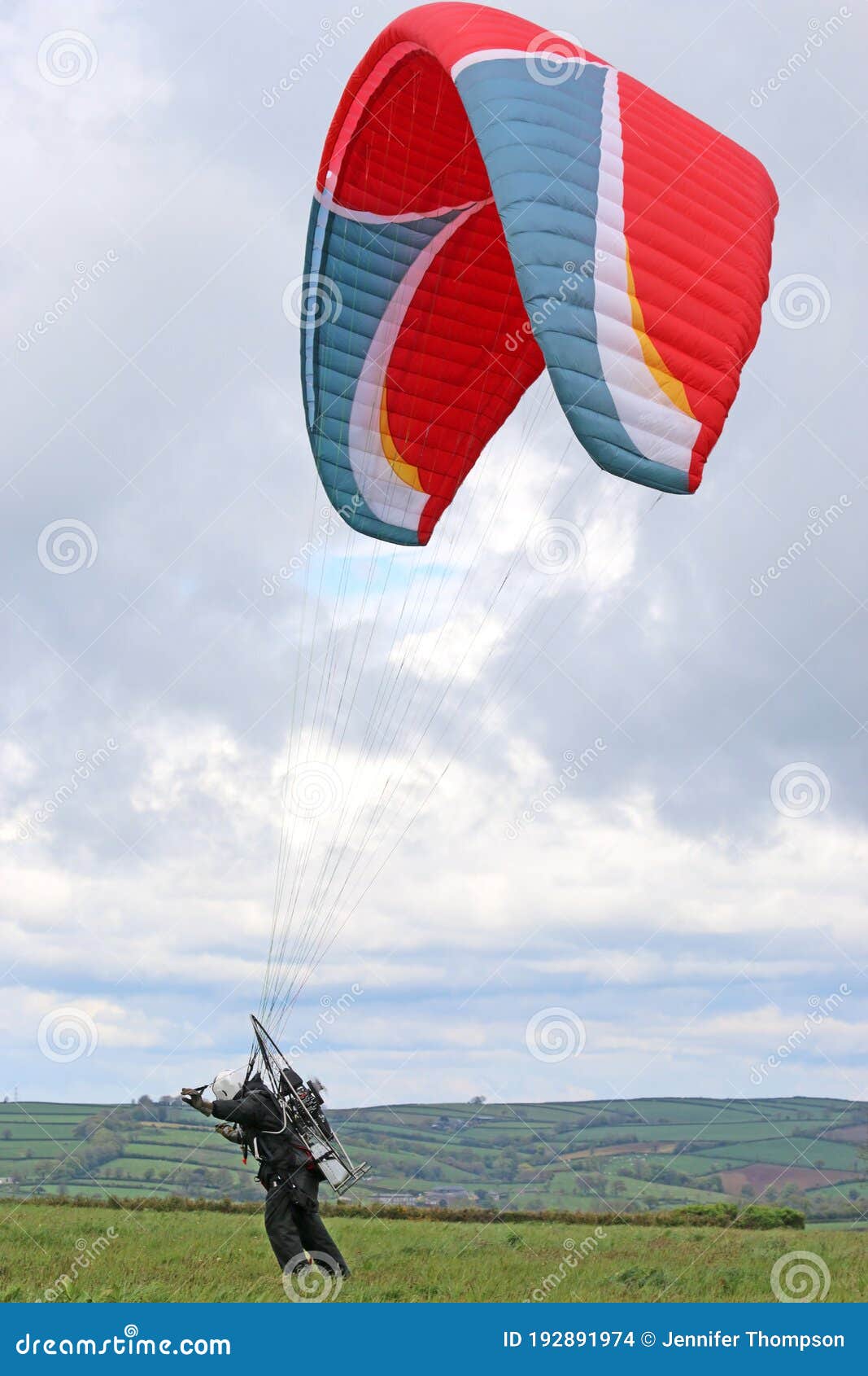 Paramotor Pilot Launching in a Field Stock Photo - Image of lines ...