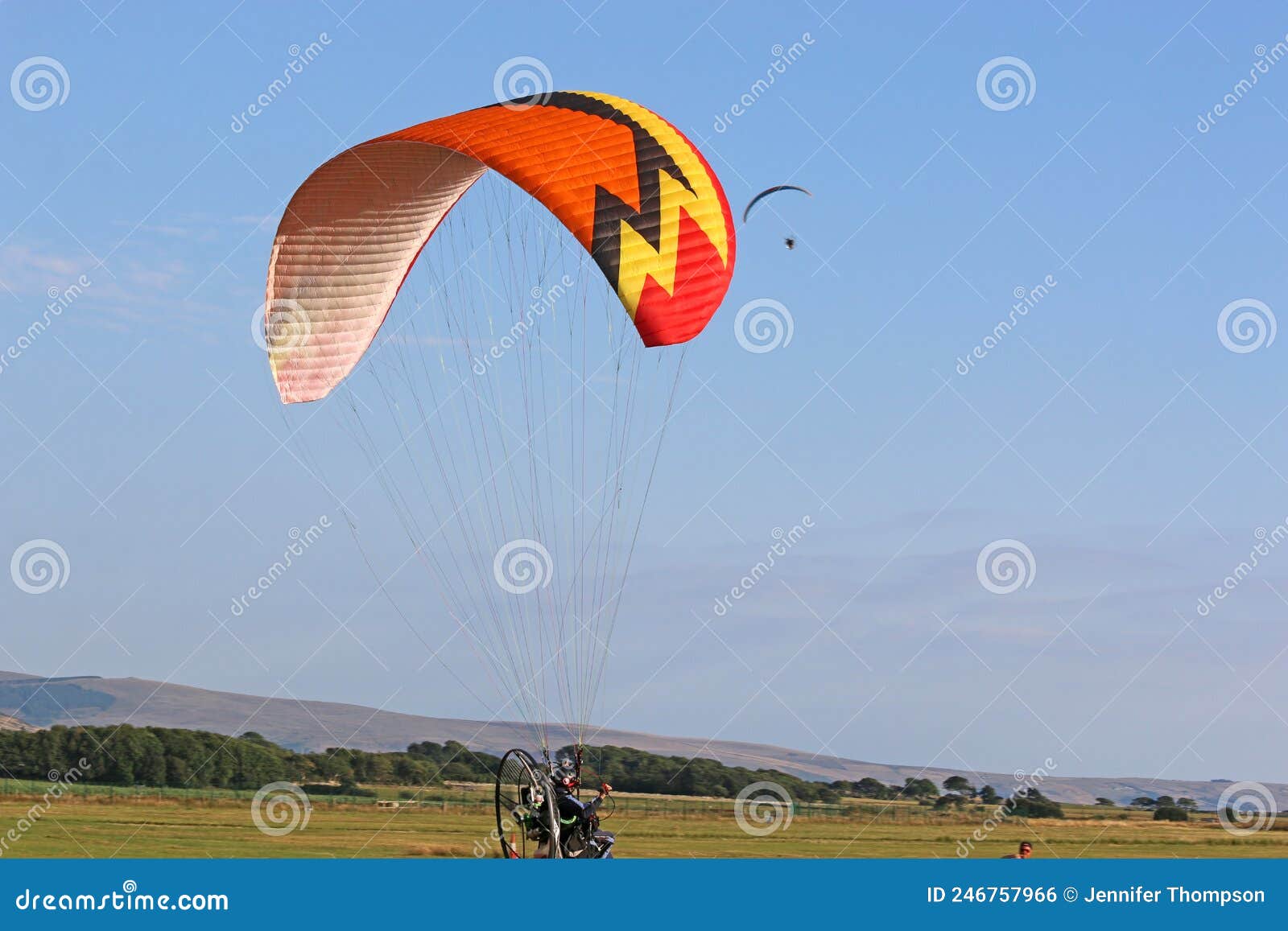 Paramotor Pilot Taking Off from a Field Stock Photo - Image of ...